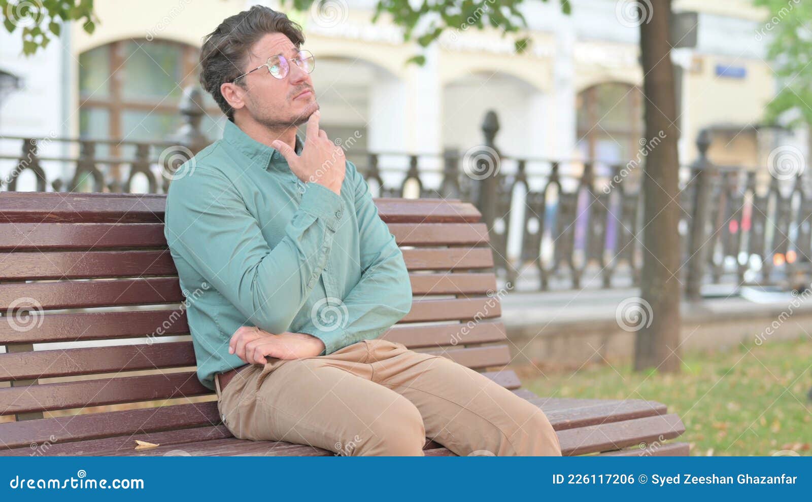 Man Thinking while Sitting on Bench Outdoor Stock Photo - Image of ...