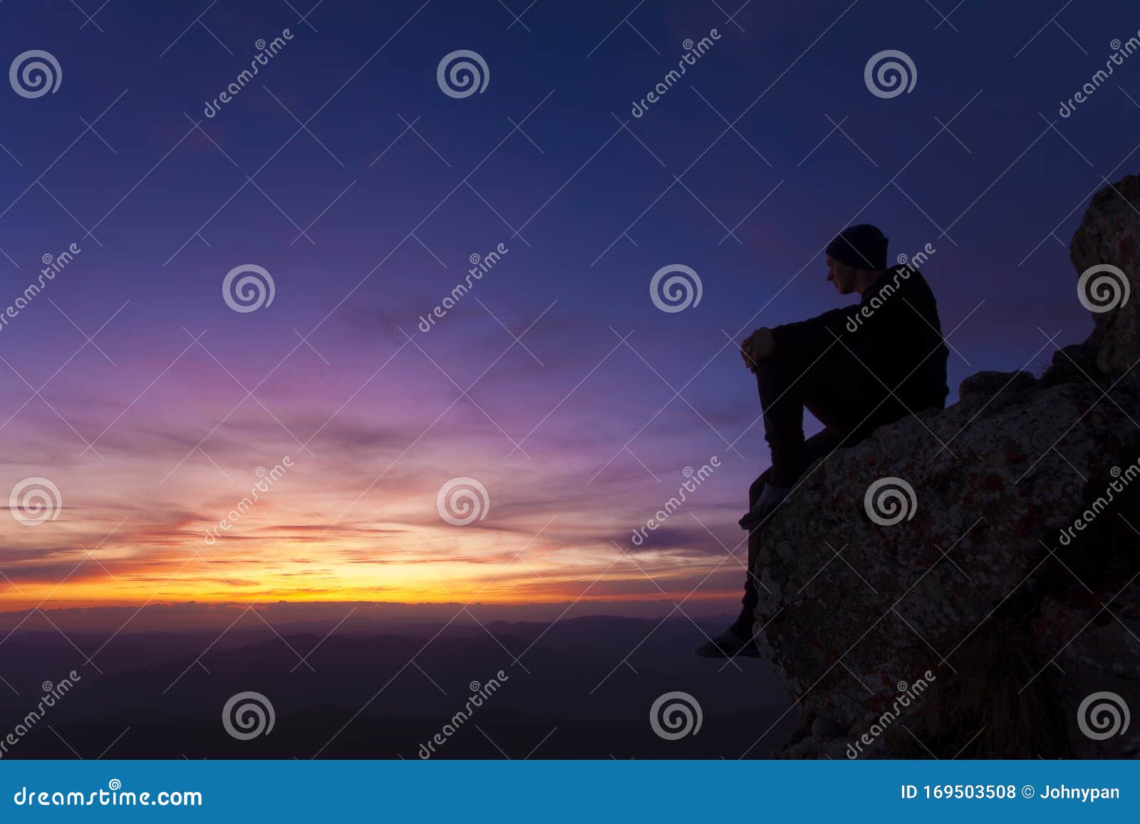 Man thinking in sunset stock photo. Image of sunset - 169503508