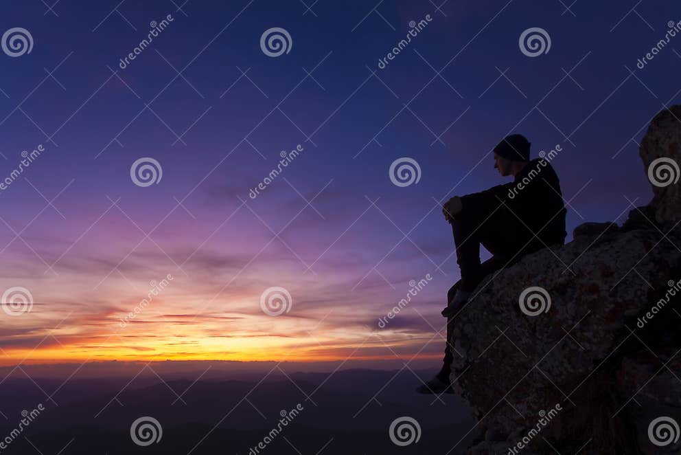 Man thinking in sunset stock photo. Image of sunset - 169503508