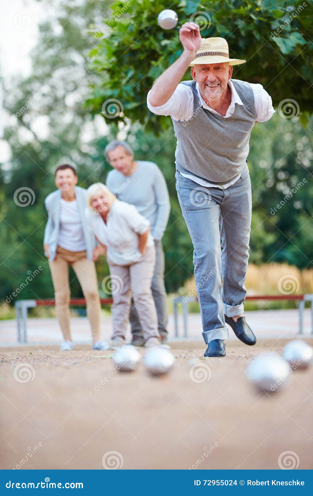 Man Throwing Ball while Playing Boule Stock Photo - Image of city ...
