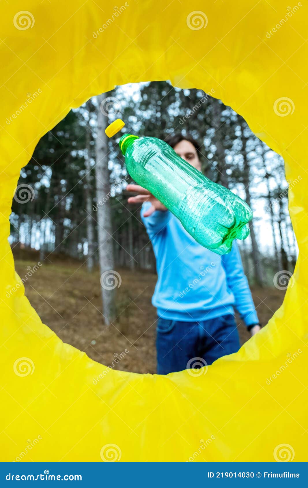 Man Throwing a Bottle into a Trash Can Stock Photo - Image of object ...