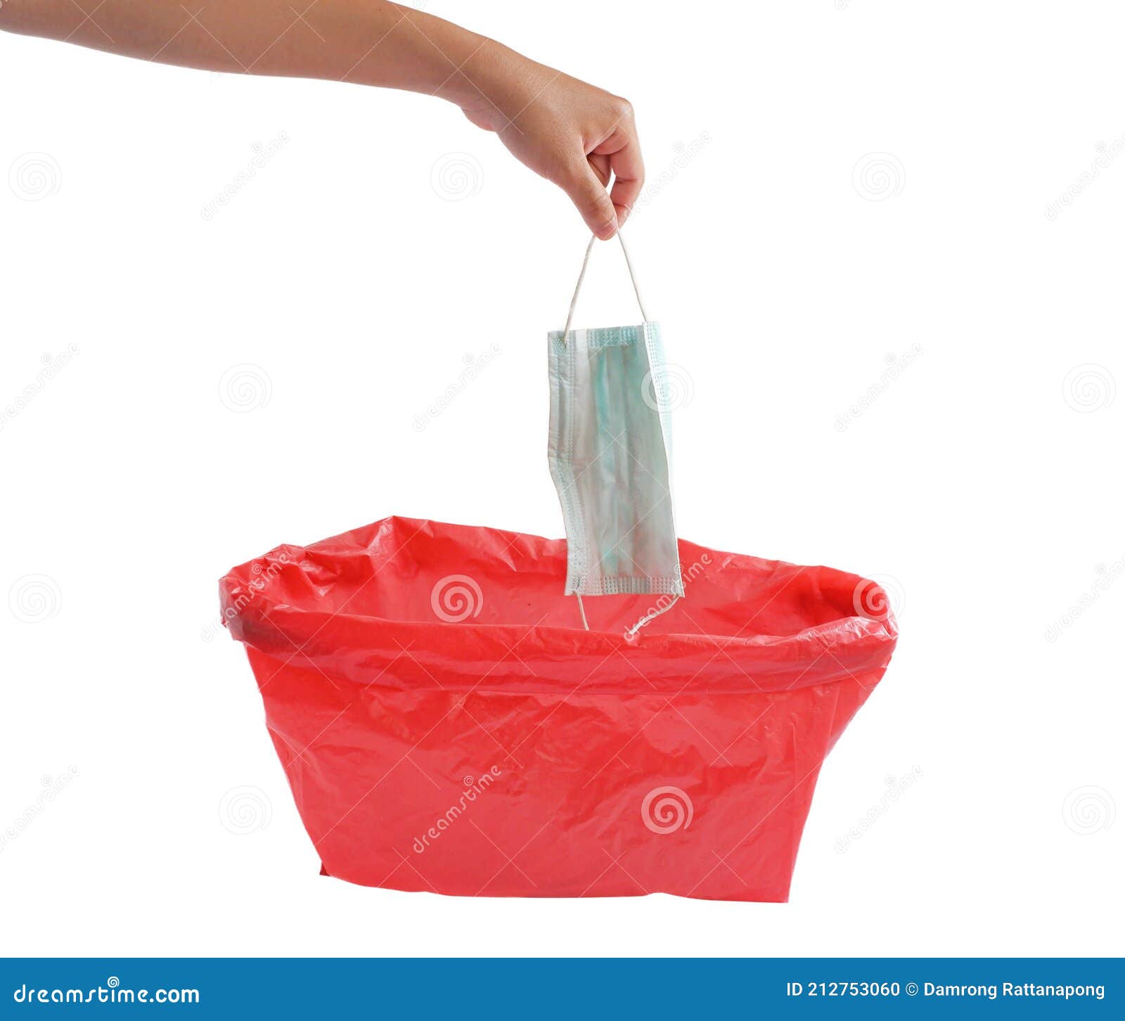 Man Throwing A Disposable Face Mask In Red Bag For Biohazards Waste ...