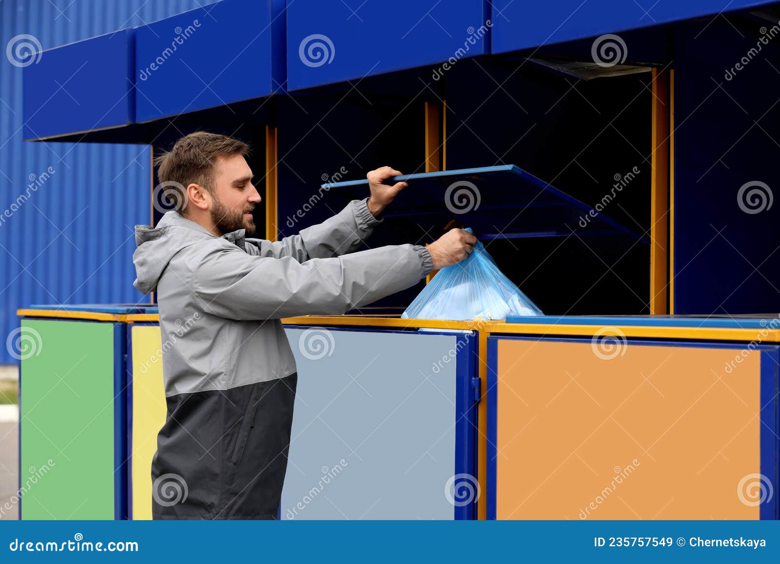 Man Throwing Garbage into Bin at Recycling Point Outdoors Stock Image ...