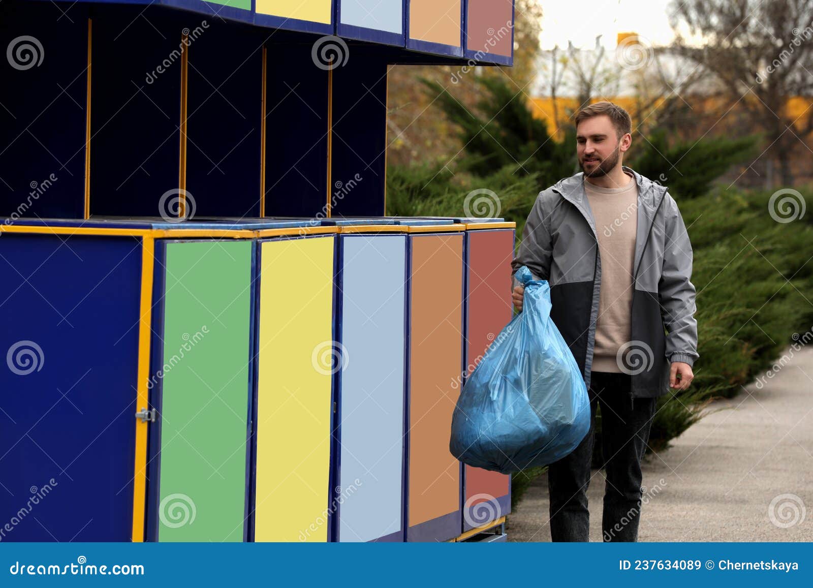 Man Throwing Garbage at Recycling Point Outdoors Stock Image - Image of ...