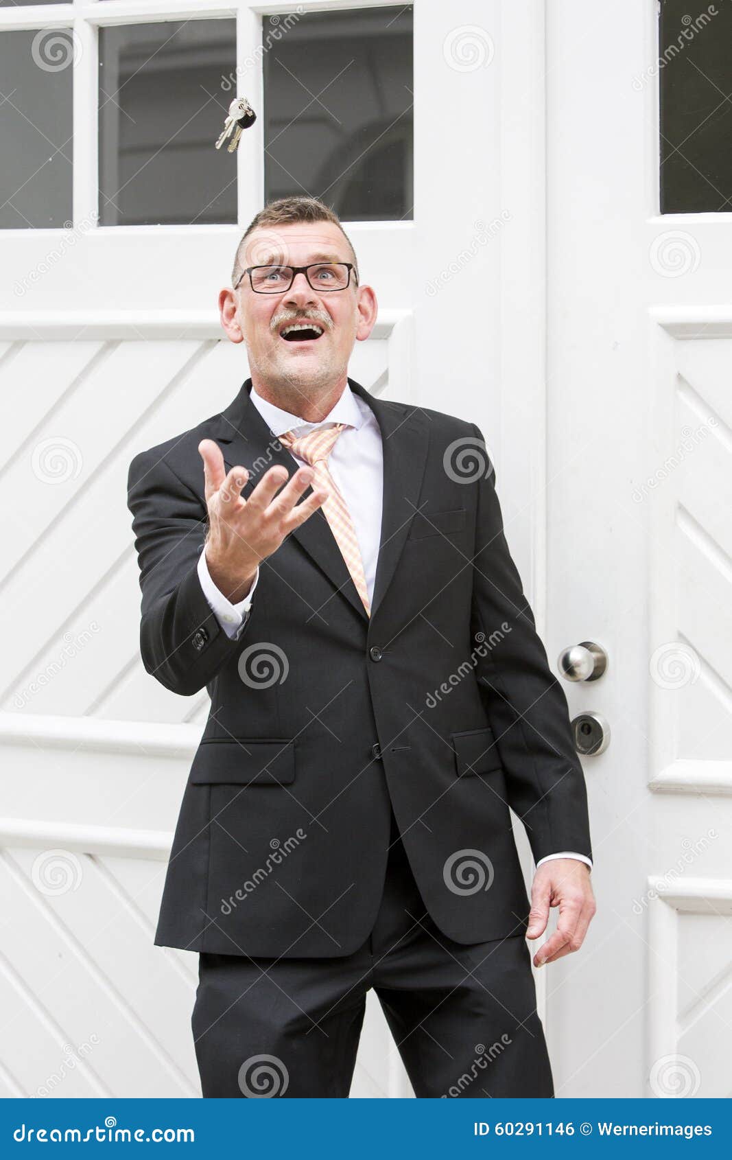 Man Throwing Keys in the Air Stock Photo - Image of close, executive ...