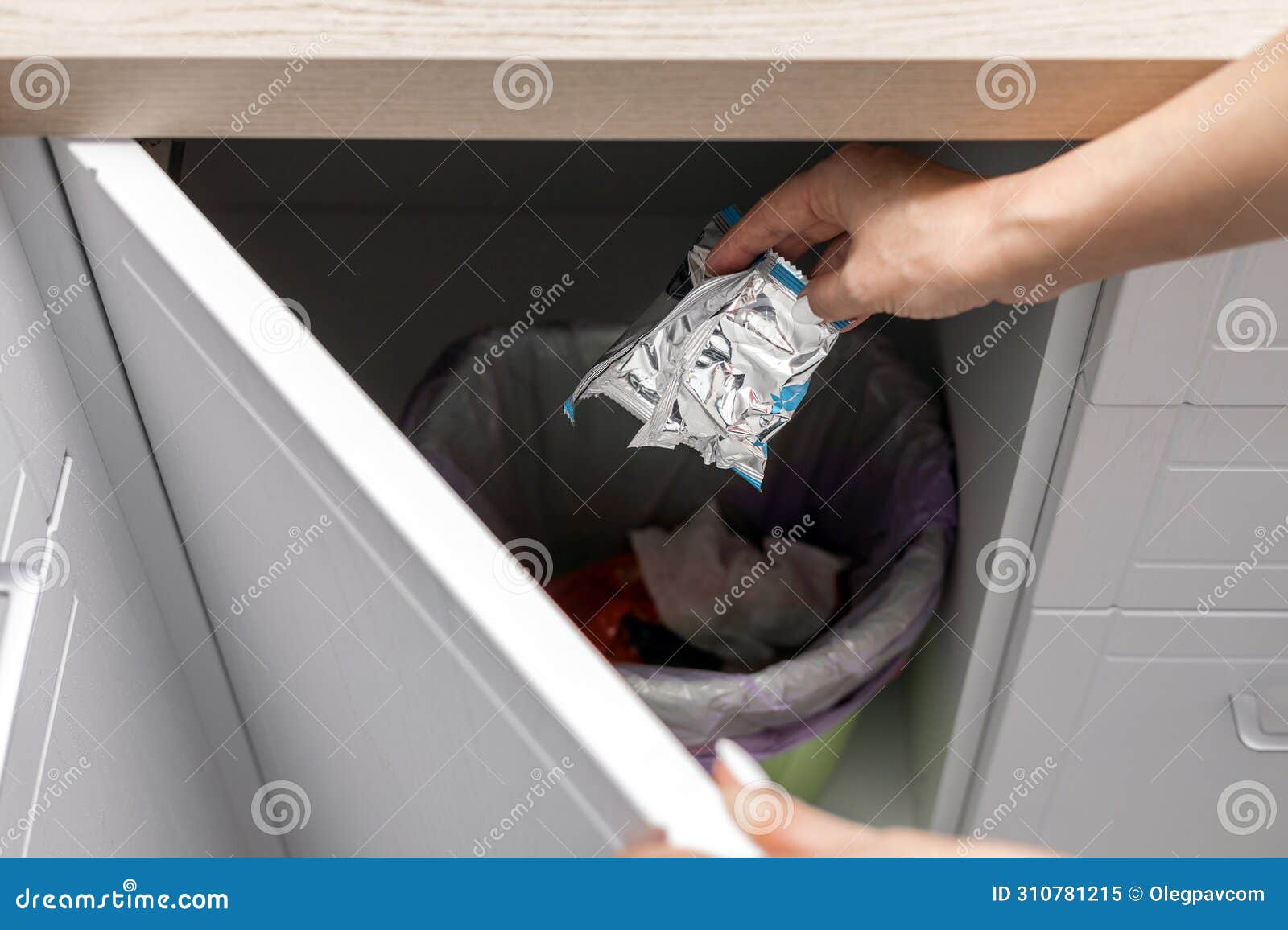 Man Throwing Plastic Packaging into Trash Bin at Home. Stock Image ...