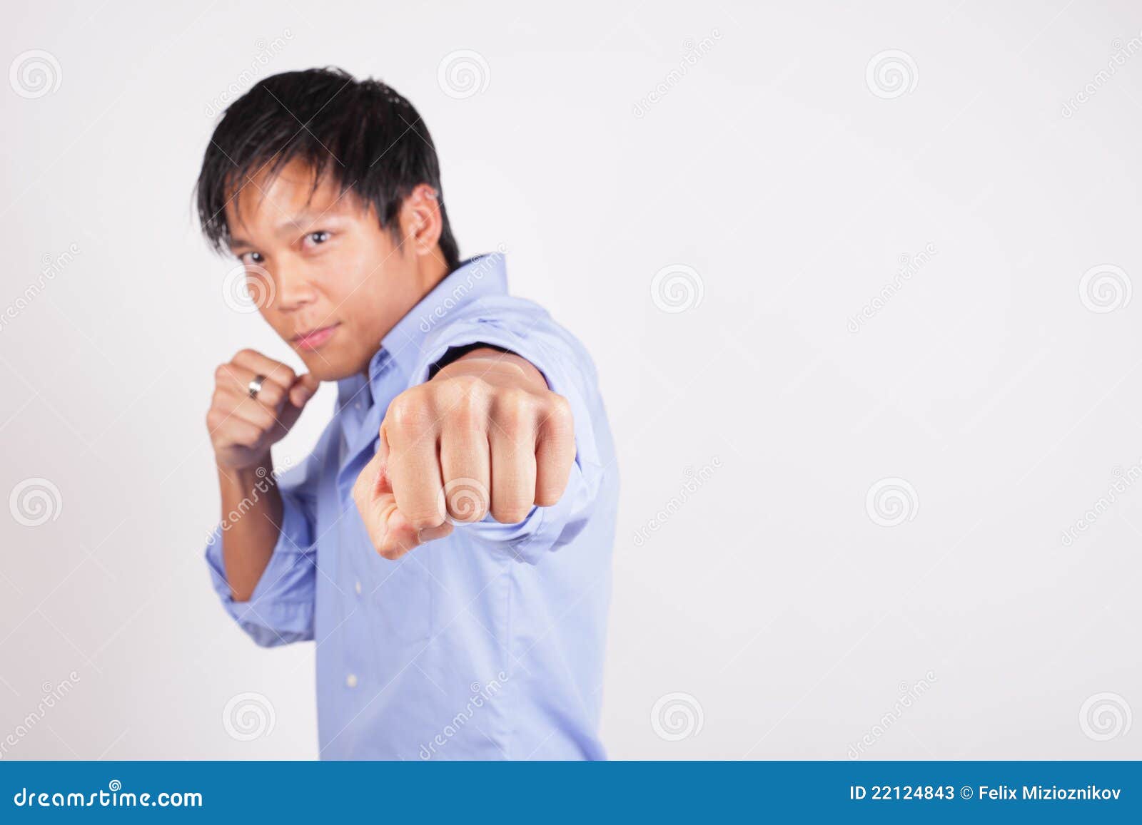 Man throwing a punch stock image. Image of fashionable - 22124843