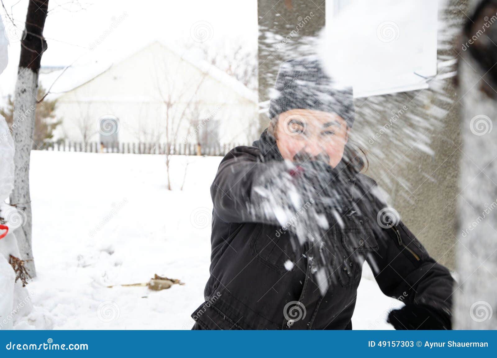 Man throwing a snowball stock image. Image of cold, recreation - 49157303