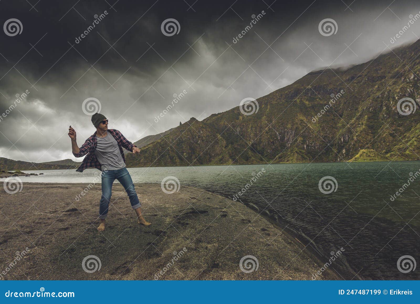 Man throwing a stone stock image. Image of beautiful - 247487199