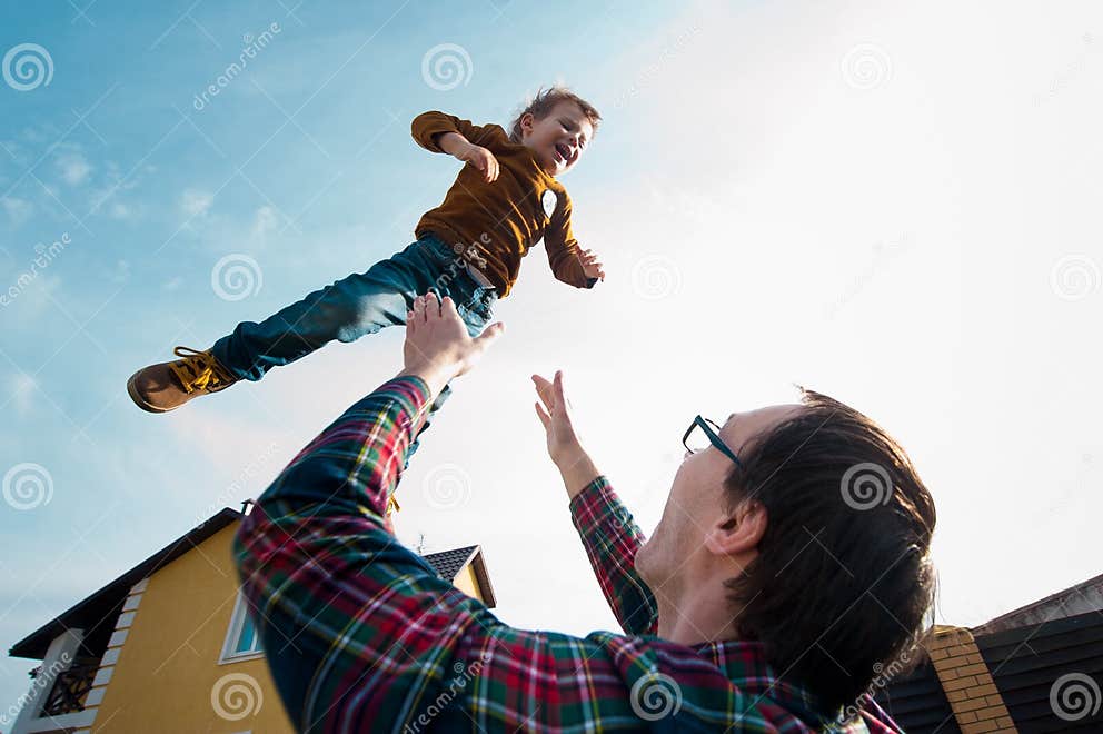 Man Throws the Boy in the Sky Stock Image - Image of baby, happiness ...