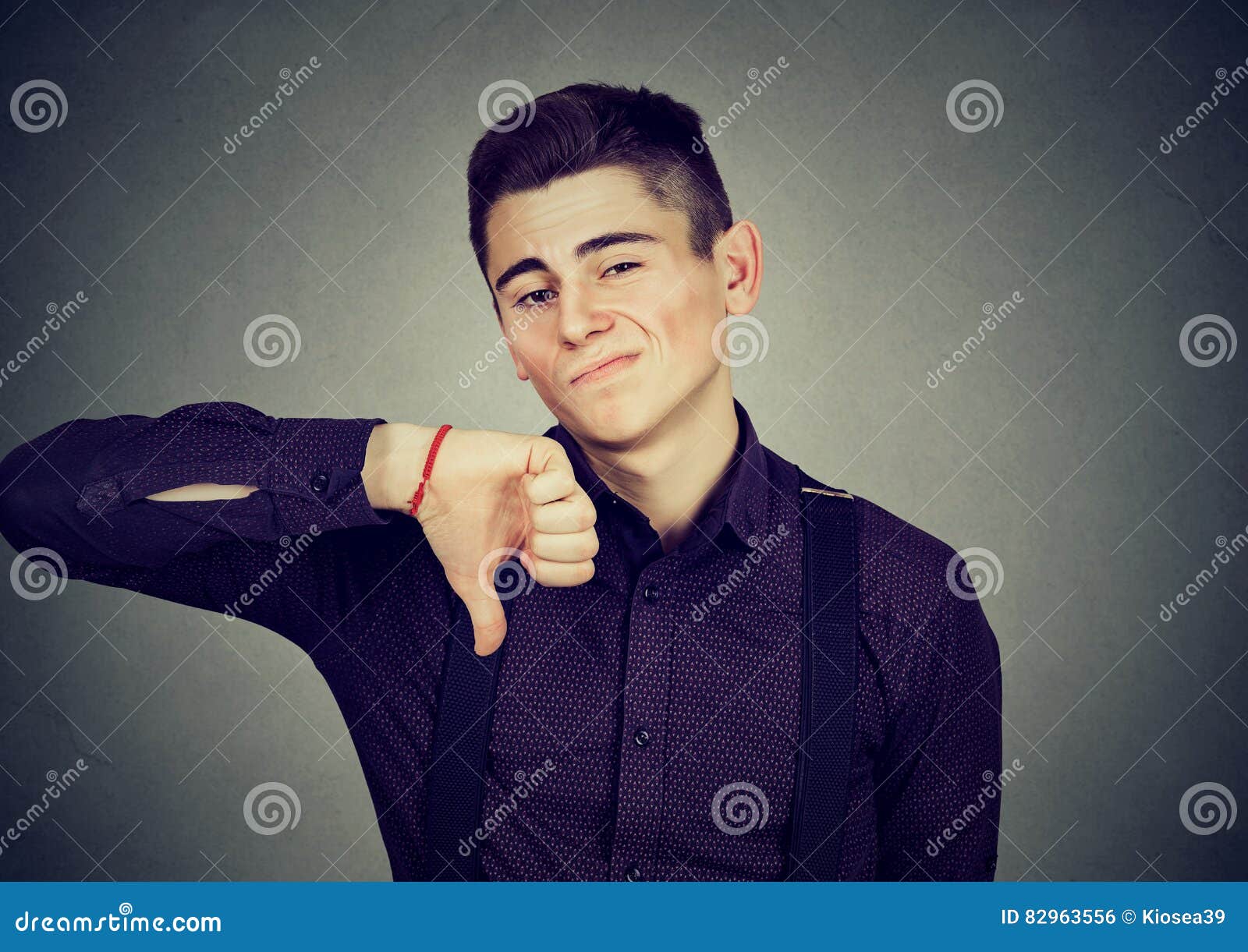 Man with Thumb Down Hand Gesture Stock Photo - Image of disgust ...