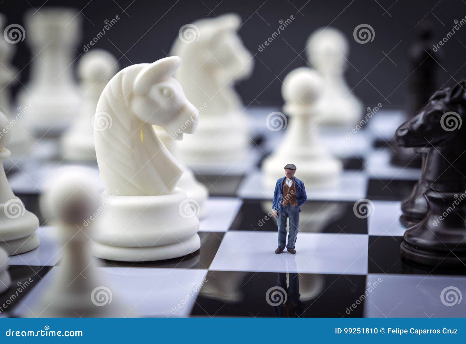Man Thumbnail within a Game of Chess Stock Photo - Image of king ...