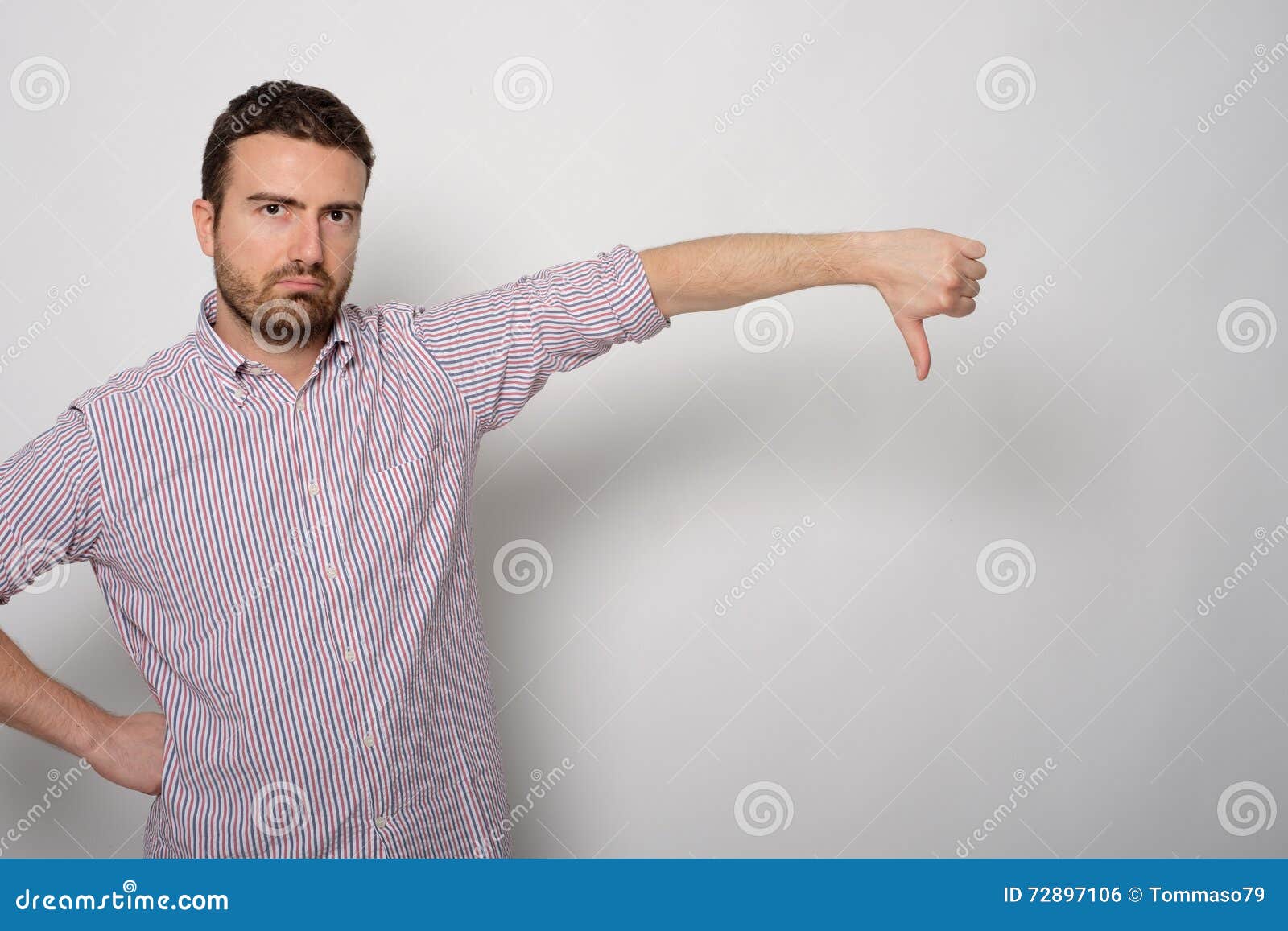 Man thumbs down stock photo. Image of funny, model, healthy - 72897106