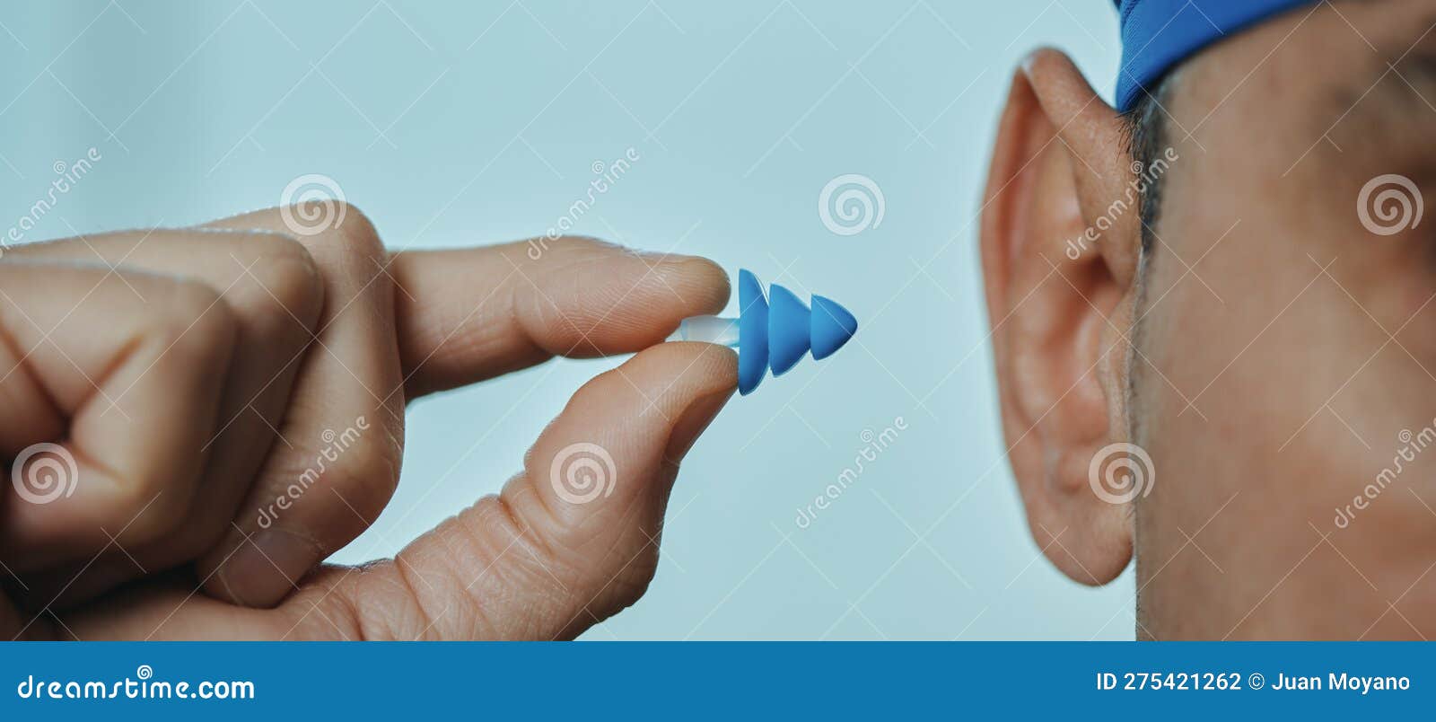 Man about To Put an Earplug, Banner Format Stock Photo - Image of ...