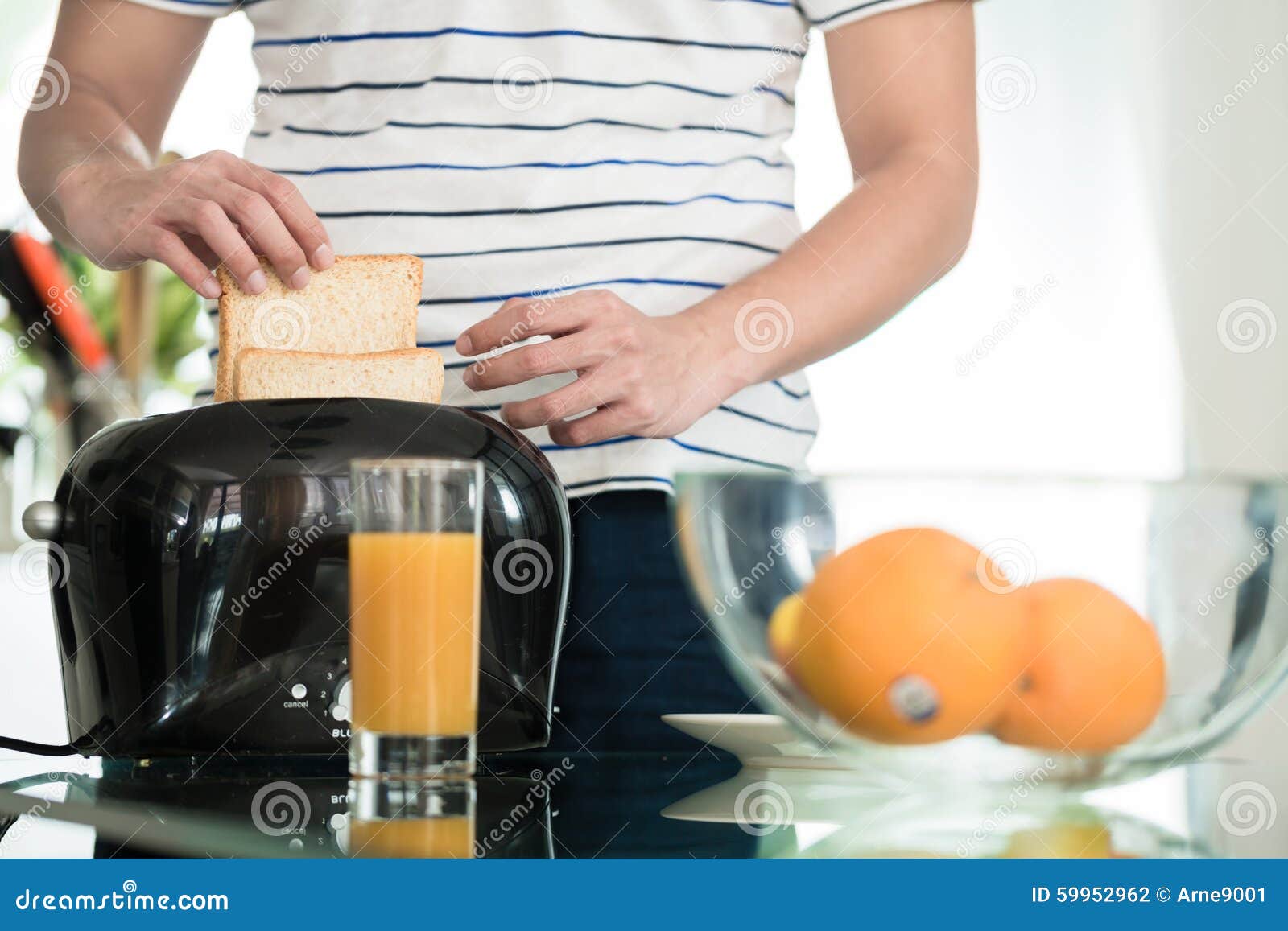 Man Toasting Bread for Breakfast Stock Photo - Image of toast, handsome ...