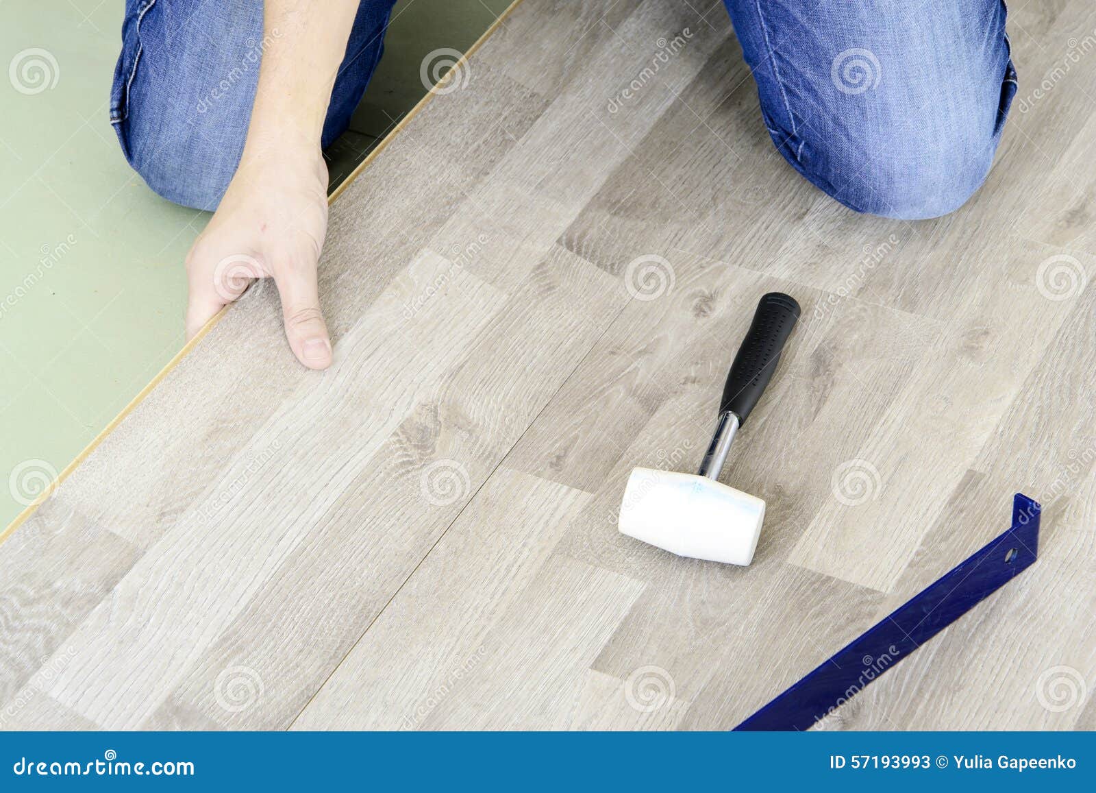 Man with Tools To Laying Laminate Stock Image - Image of contractor ...