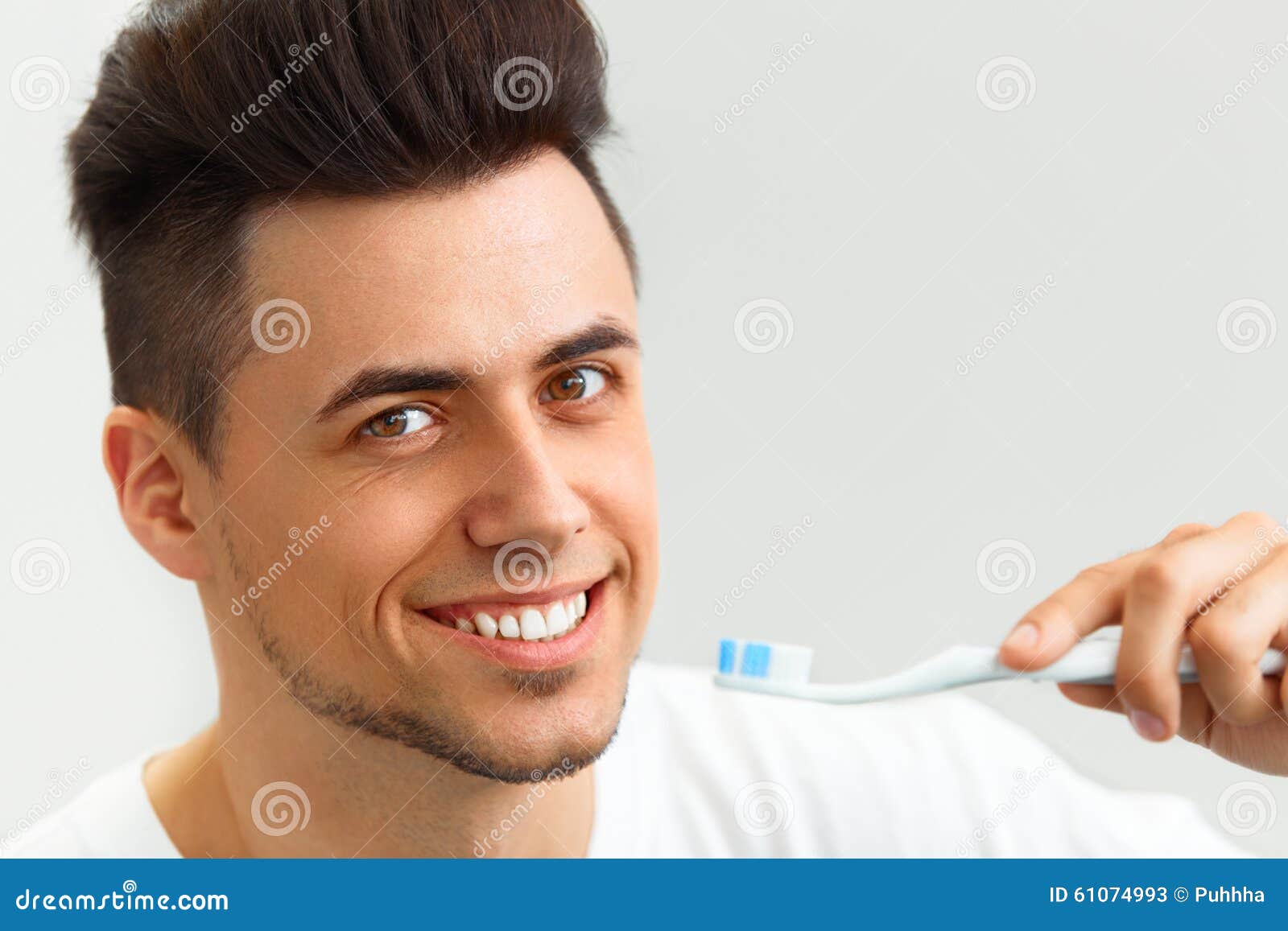 Man with Toothbrush. Man Brushing His Teeth and Smiling Stock Image ...