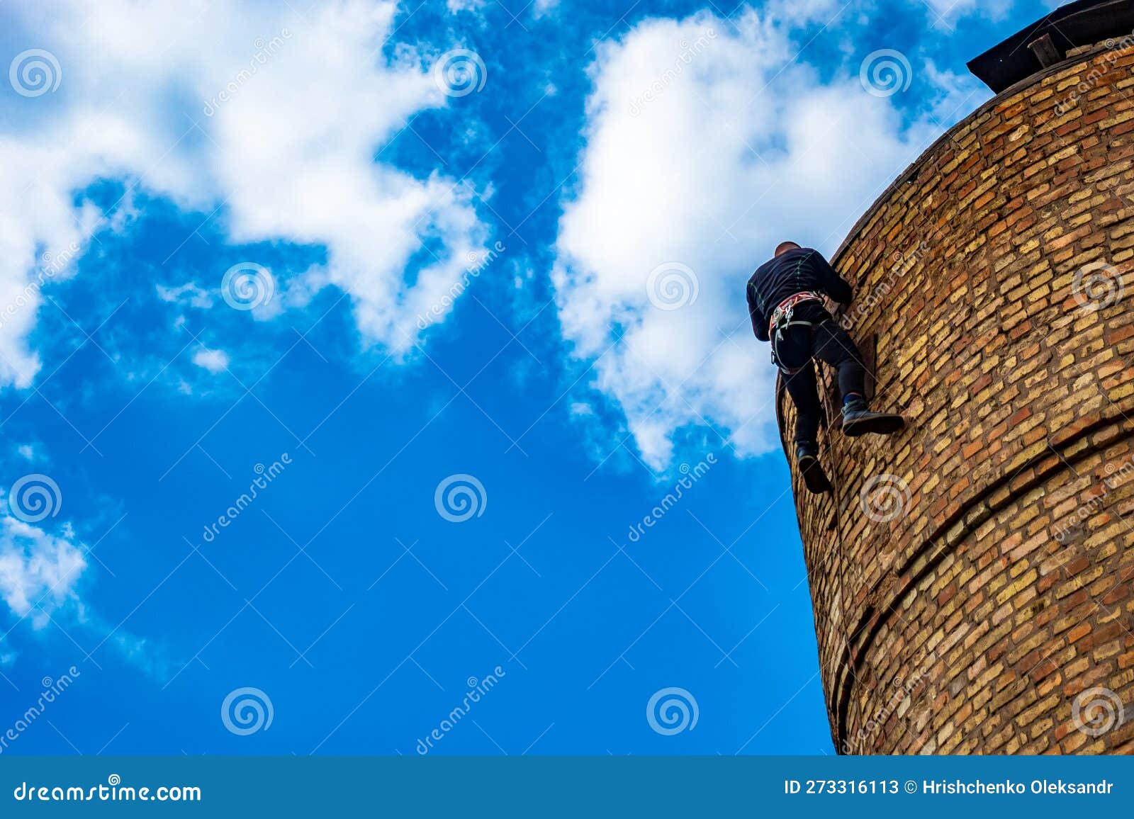 Man on Top of a Water Tower Stock Image - Image of fearless, high ...