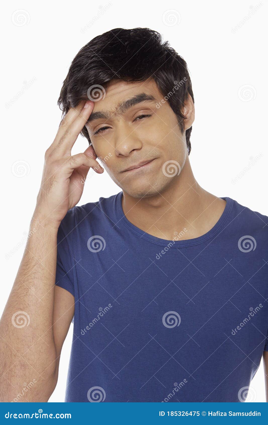 Man touching his forehead stock image. Image of hand - 185326475