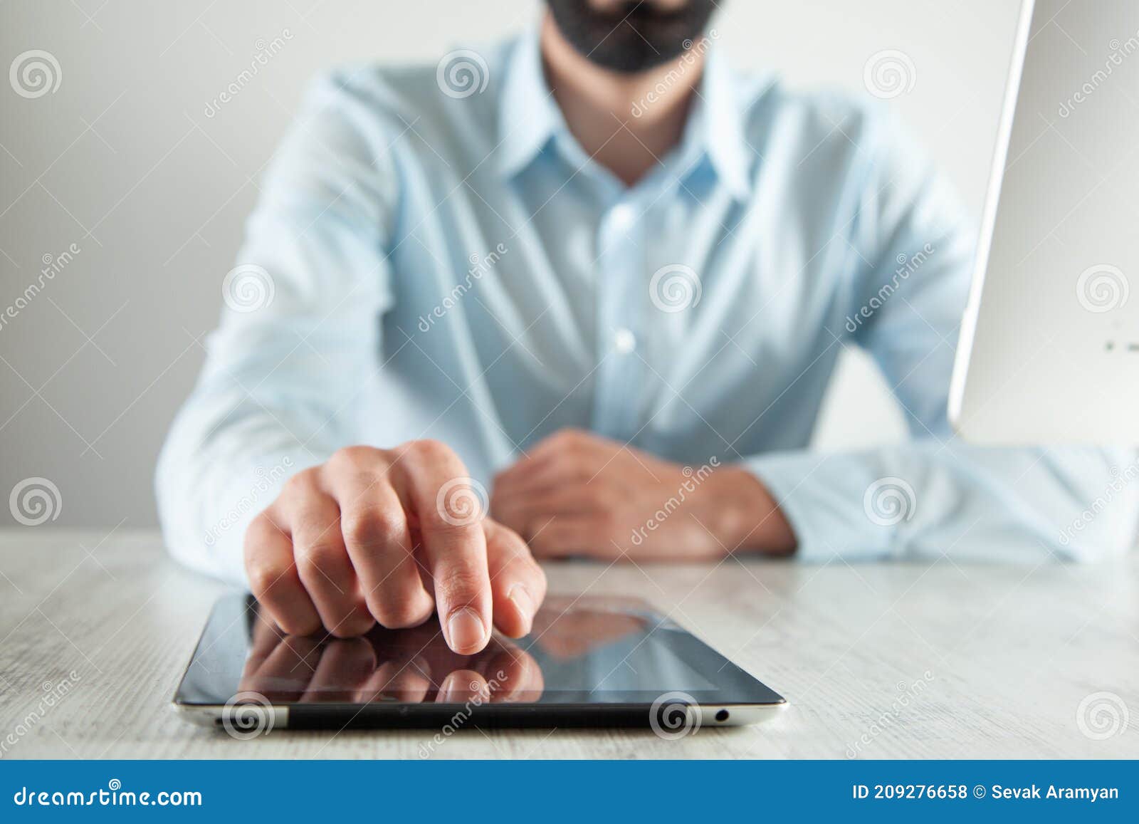 Man Touching Tablet on Desk Stock Photo - Image of tablet, blank: 209276658