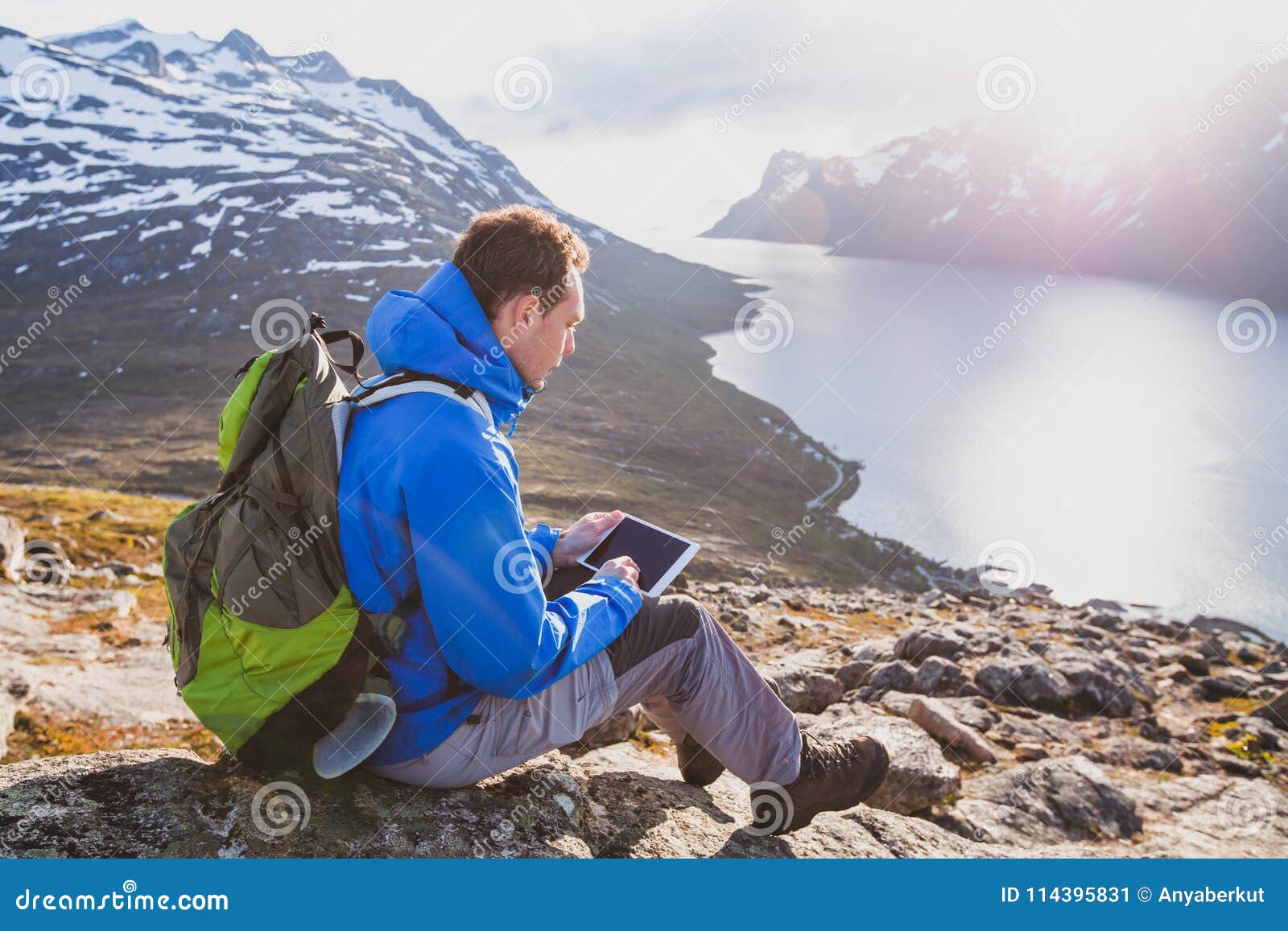 Tourist Backpacker Using Internet Application on Tablet Computer ...