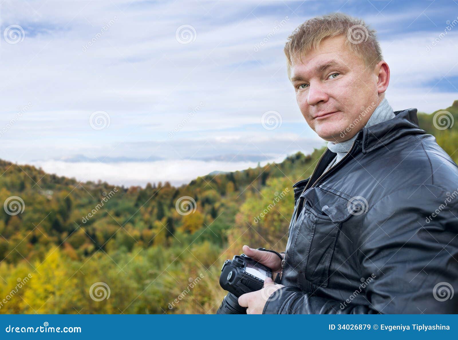 Man tourist with camera stock image. Image of scenery - 34026879
