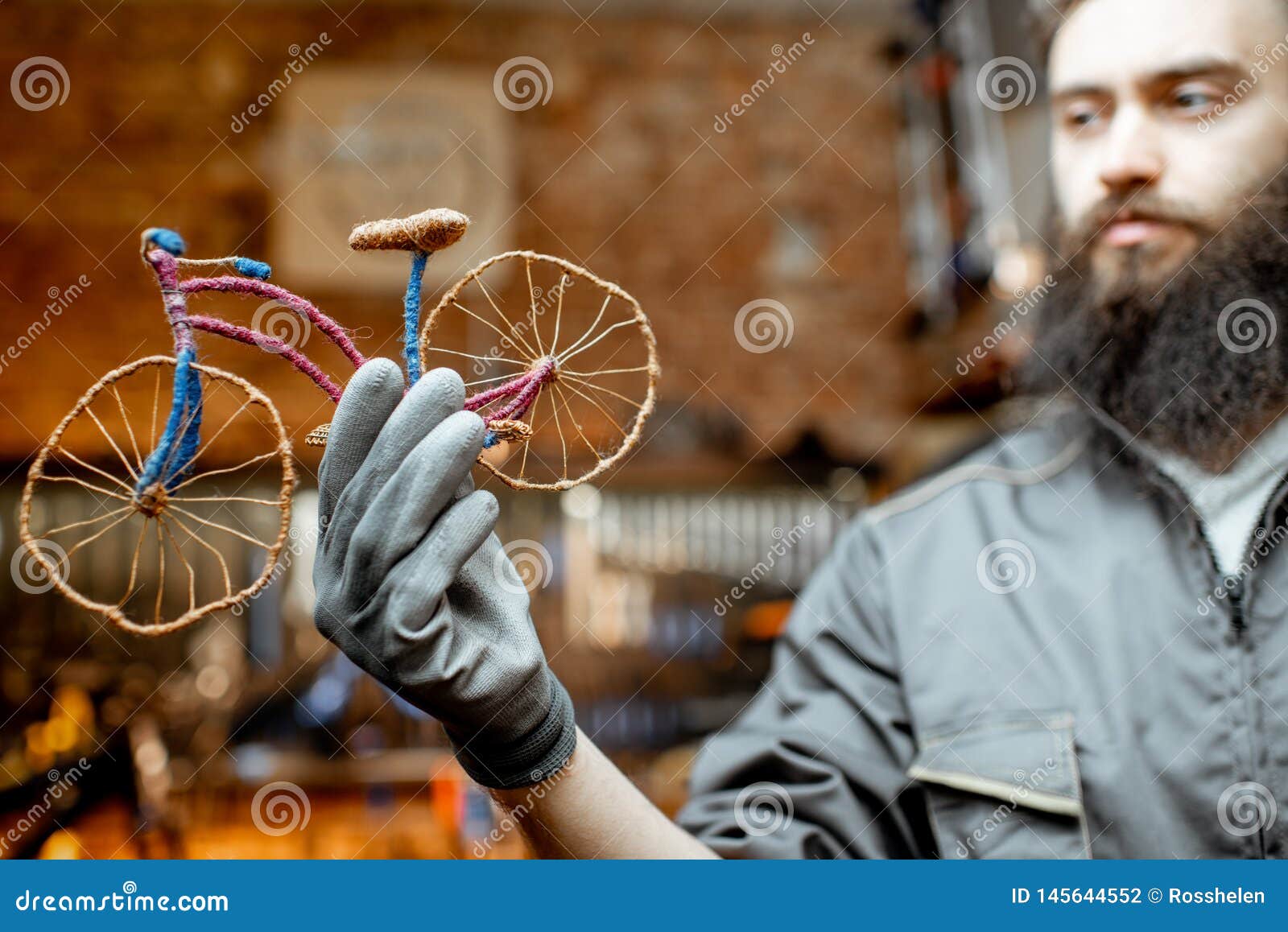 Man with Toy Bicycle at the Workshop Stock Photo - Image of mechanic ...