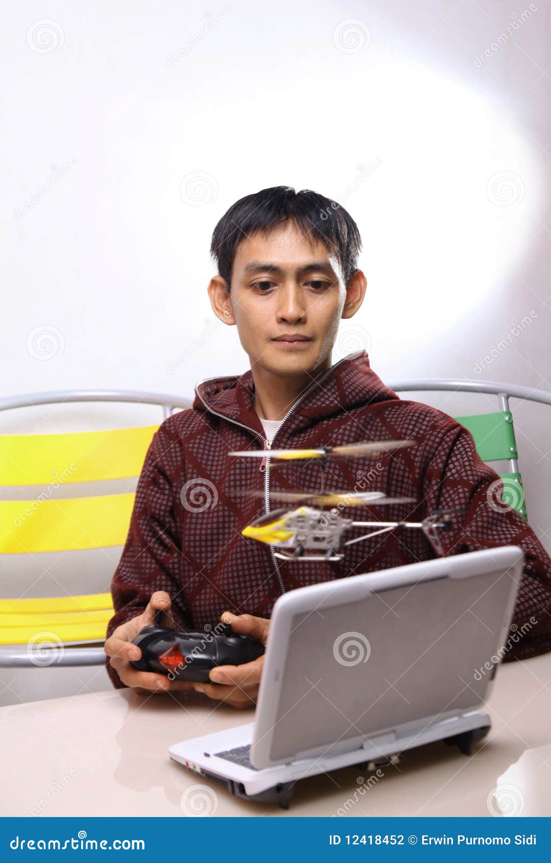 Man with toys stock photo. Image of home, portrait, chair - 12418452