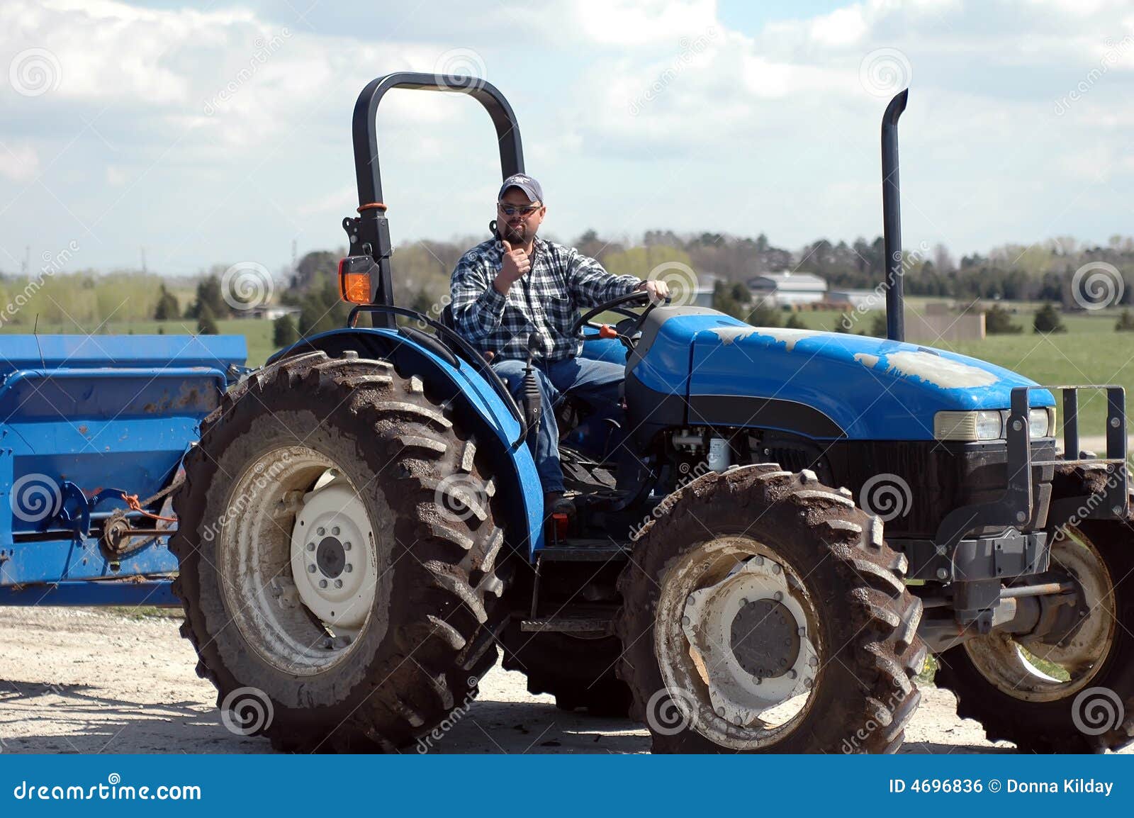 Man on tractor stock photo. Image of worker, shirt, farm - 4696836