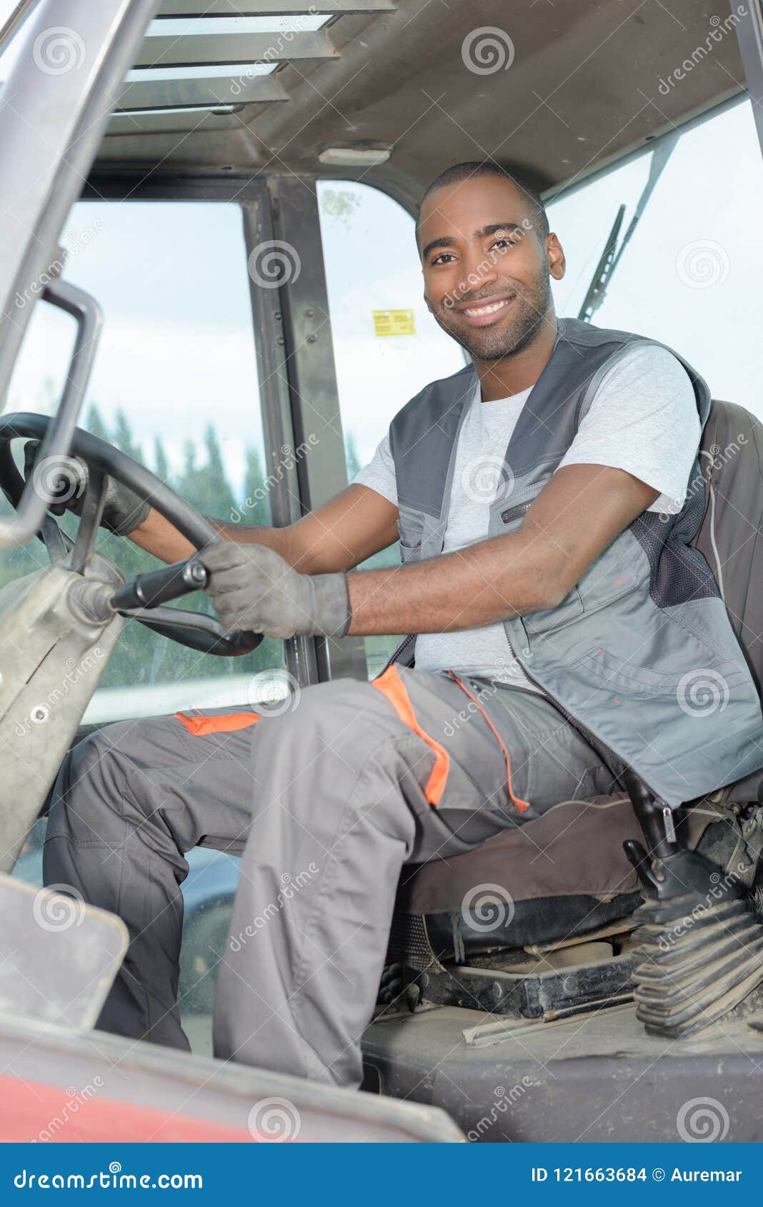 Man in tractor at farm stock photo. Image of equipment - 121663684