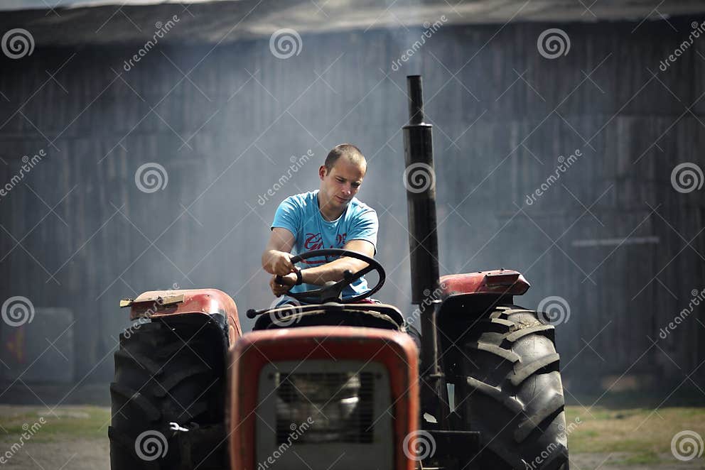 Man in tractor stock image. Image of farm, backyard, chimney - 48351981