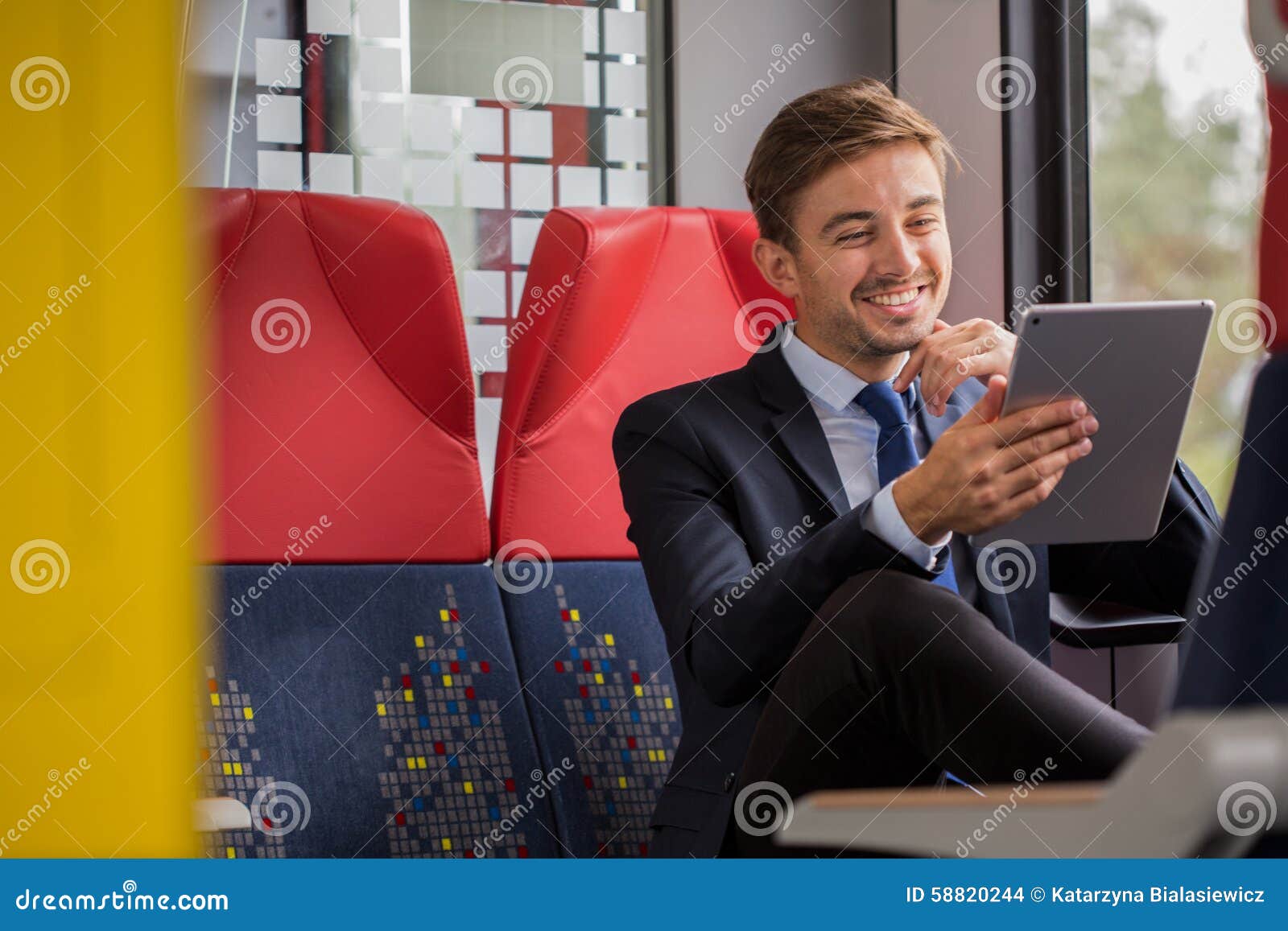 Man in train commuting stock photo. Image of commuting - 58820244