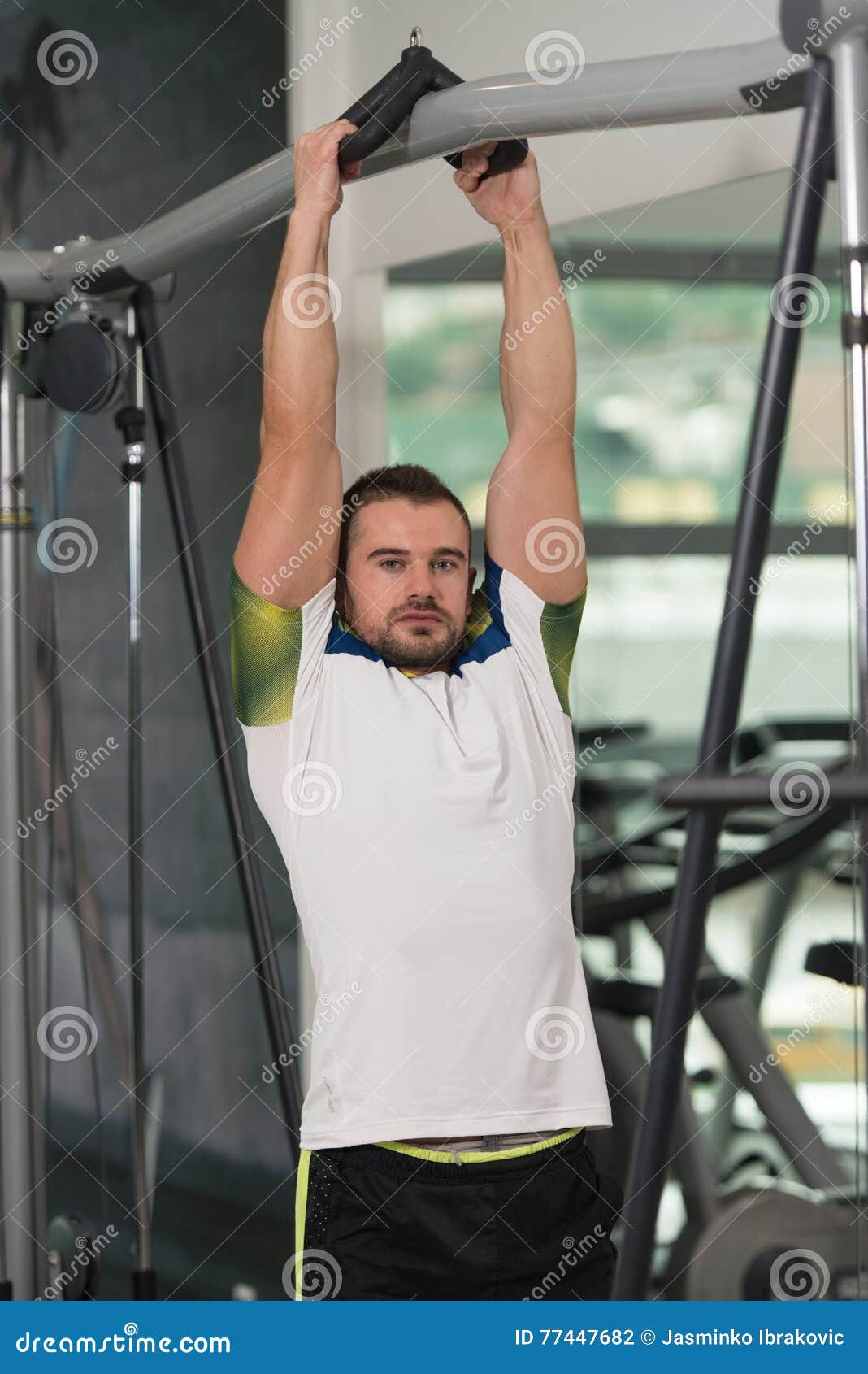 Man Training Back Exercises on a Machine Stock Photo - Image of ...