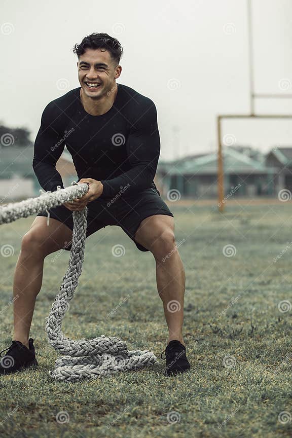 Man Training with Battle Ropes Stock Photo - Image of male, battle ...
