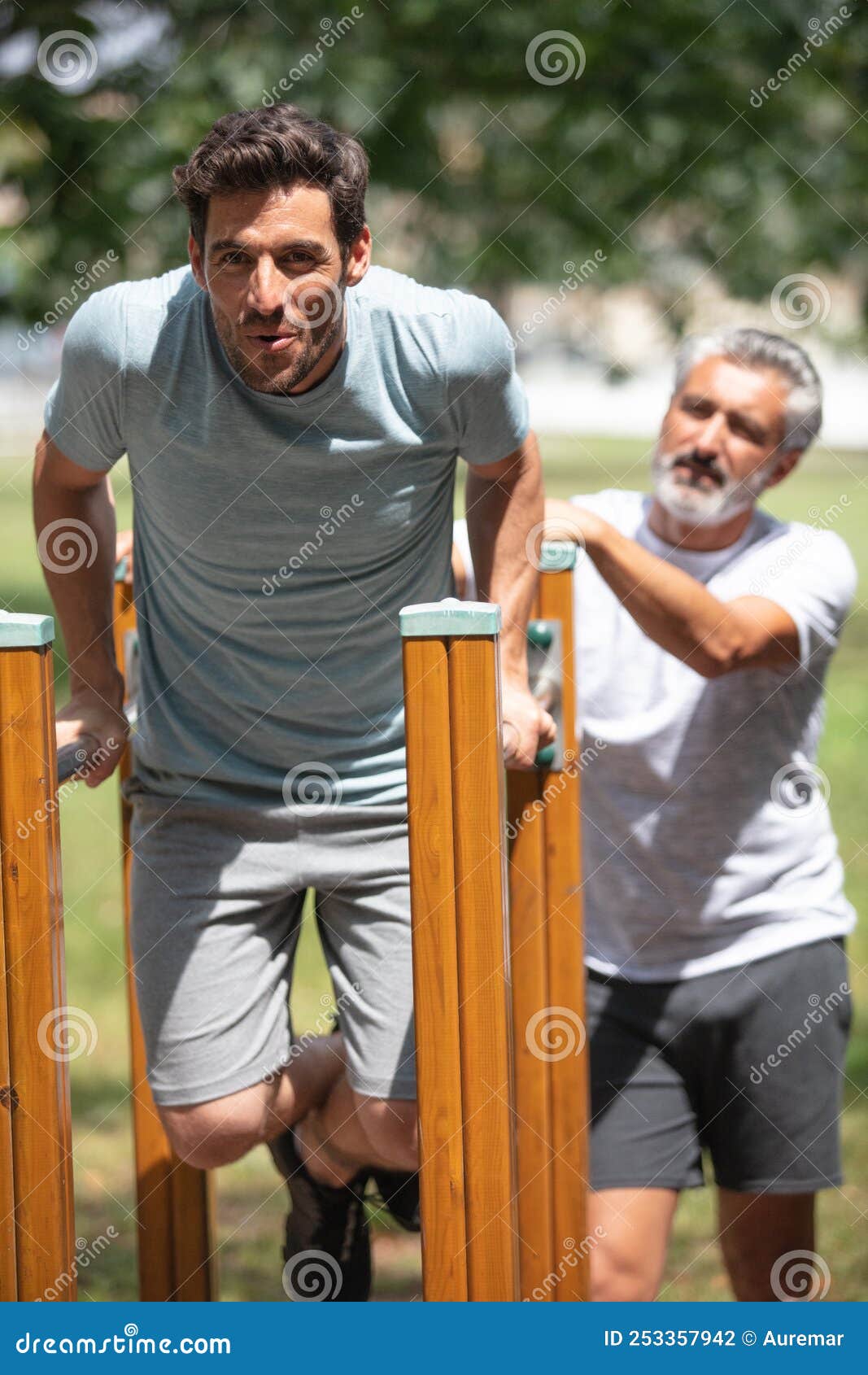 Man Training on Chin-up Bar Together with Elder Coach Stock Photo - Image of sport, crossfit ...