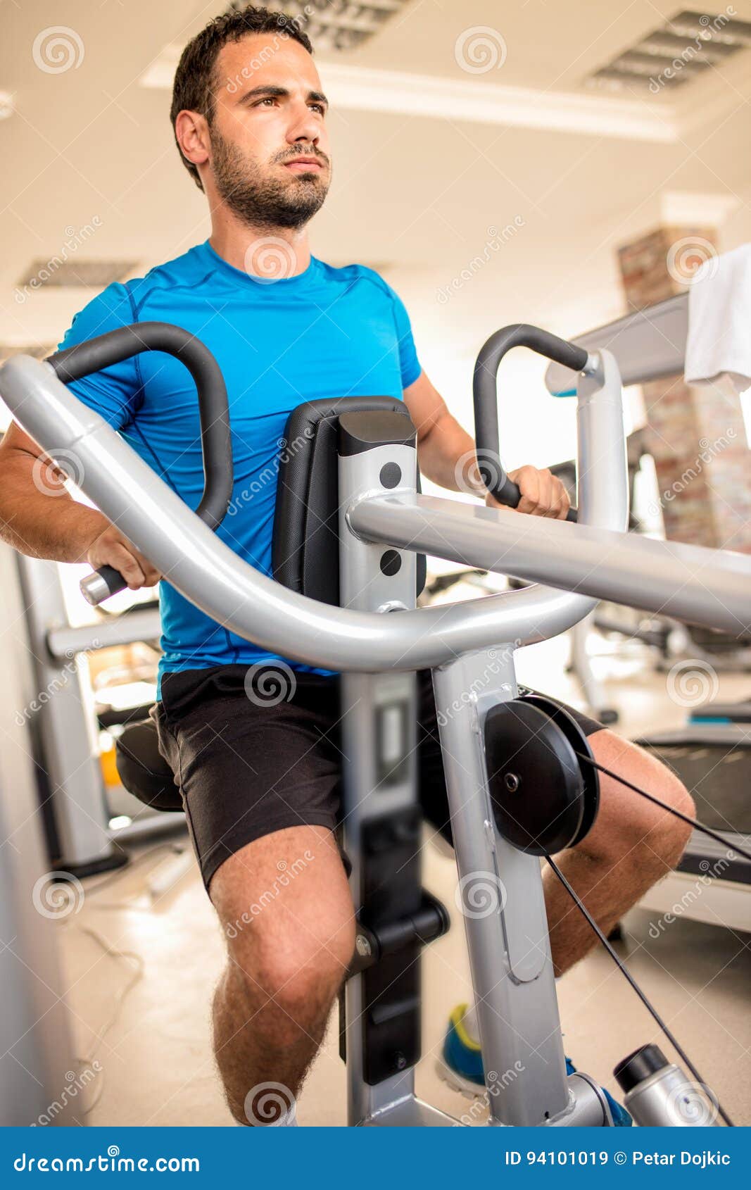 Man training in a gym stock image. Image of indoor, male - 94101019