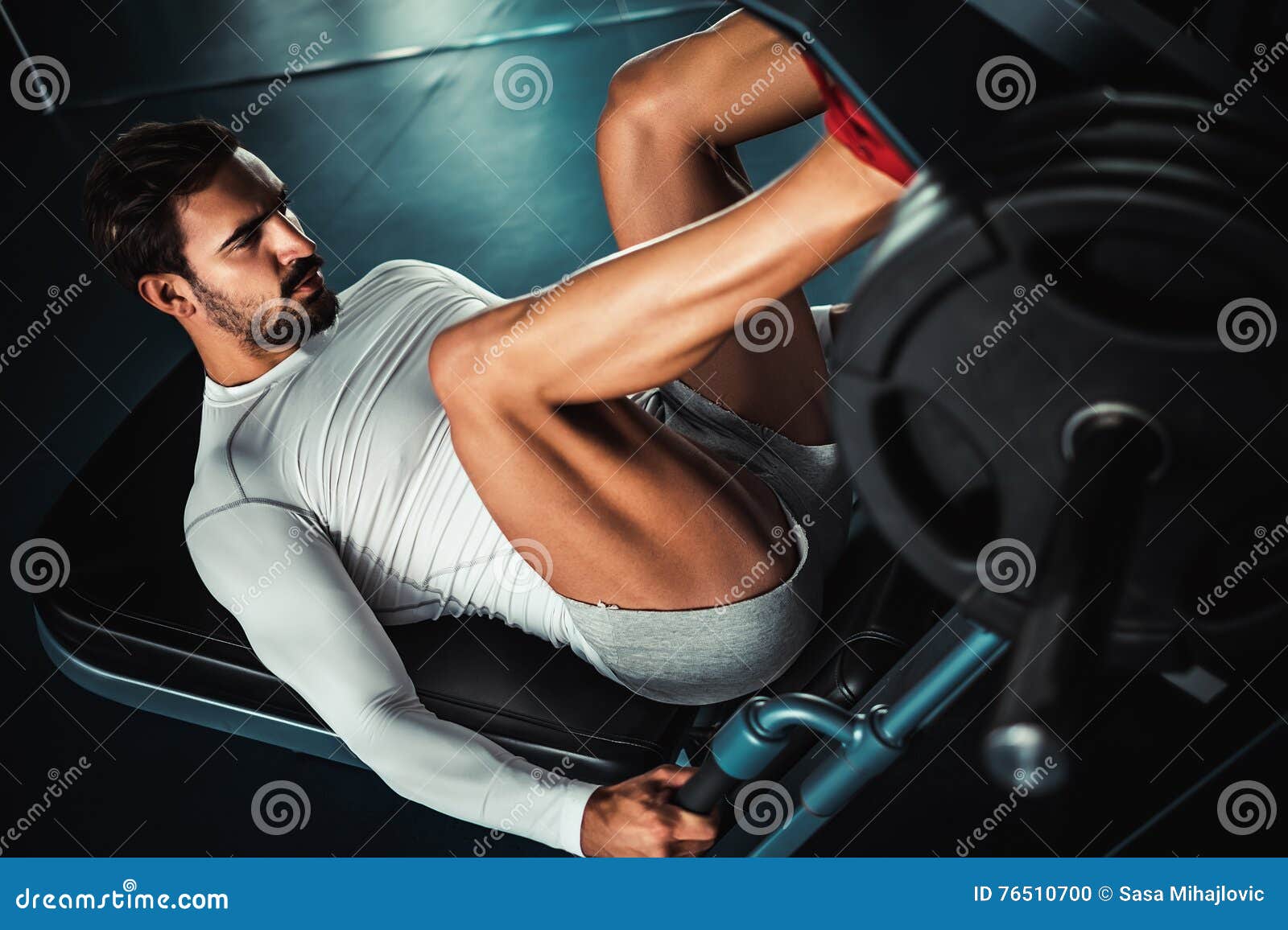 Man Training Legs on Leg Press Machine Stock Photo - Image of beard ...
