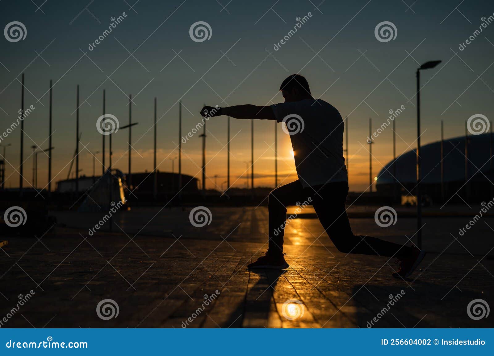 A Man Trains Boxing at Sunset Outdoors. Stock Photo - Image of hitting ...