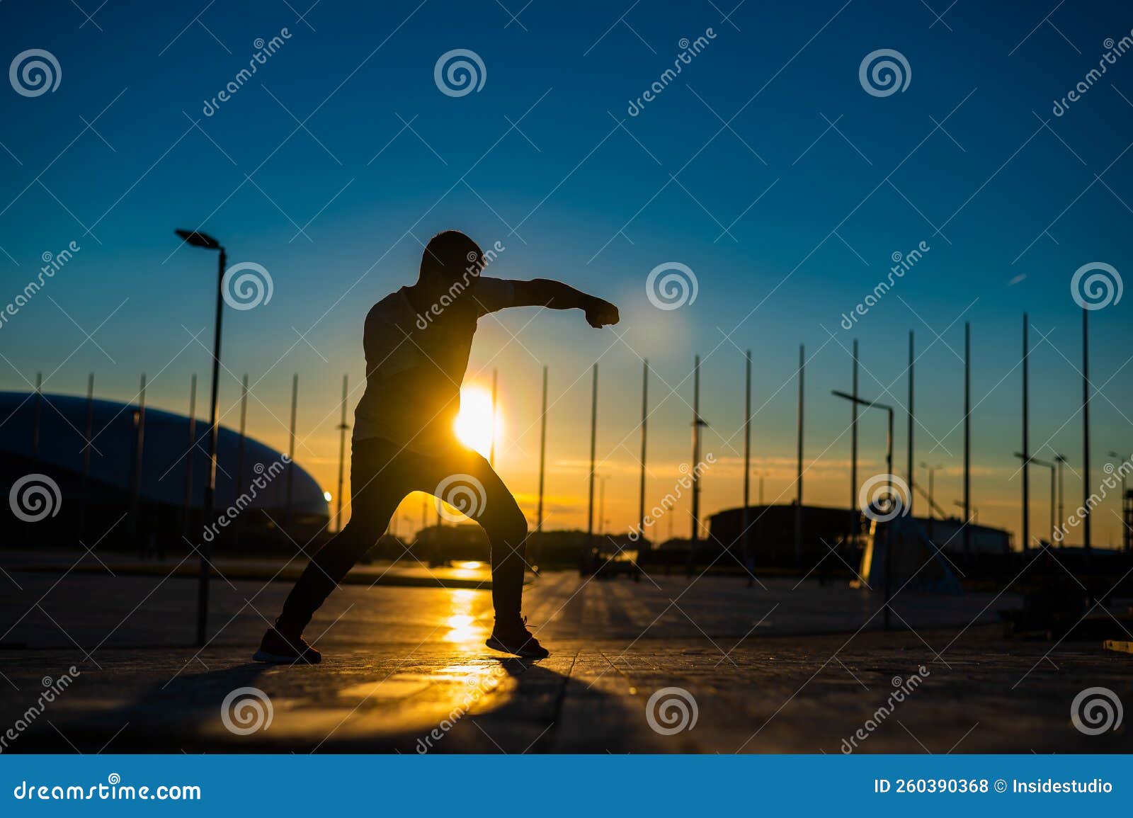 A Man Trains Boxing at Sunset Outdoors. Stock Photo - Image of daytime ...
