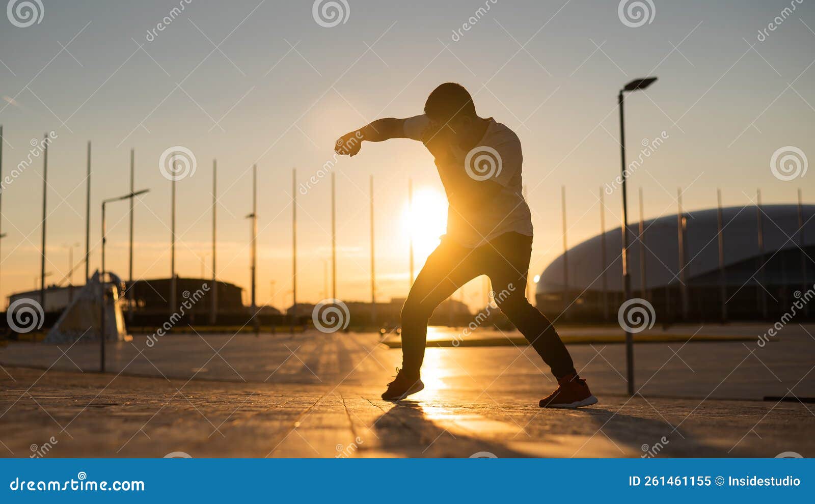A Man Trains Boxing at Sunset Outdoors. Stock Image - Image of karate ...