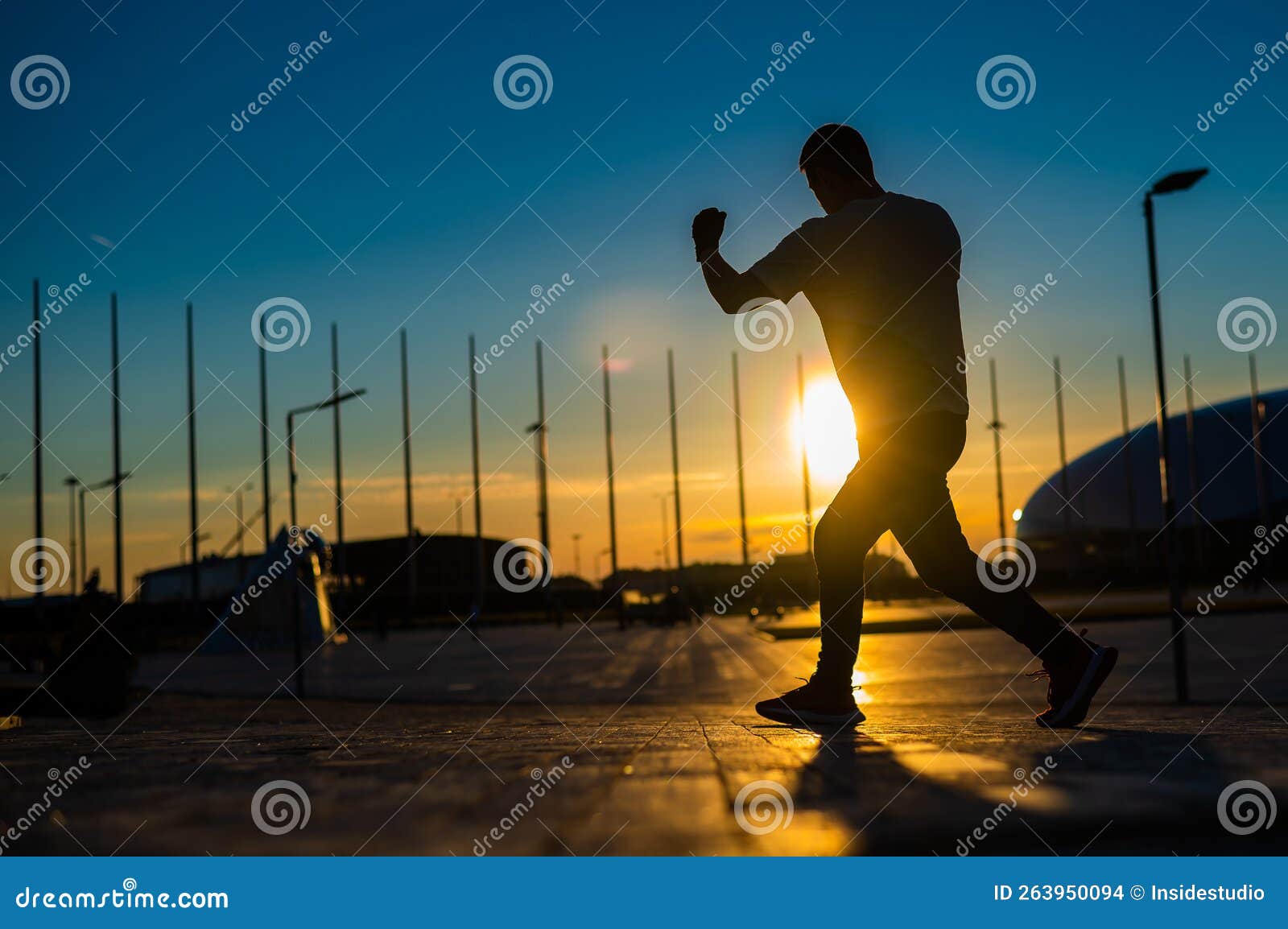 A Man Trains Boxing at Sunset Outdoors. Stock Photo - Image of healthy ...
