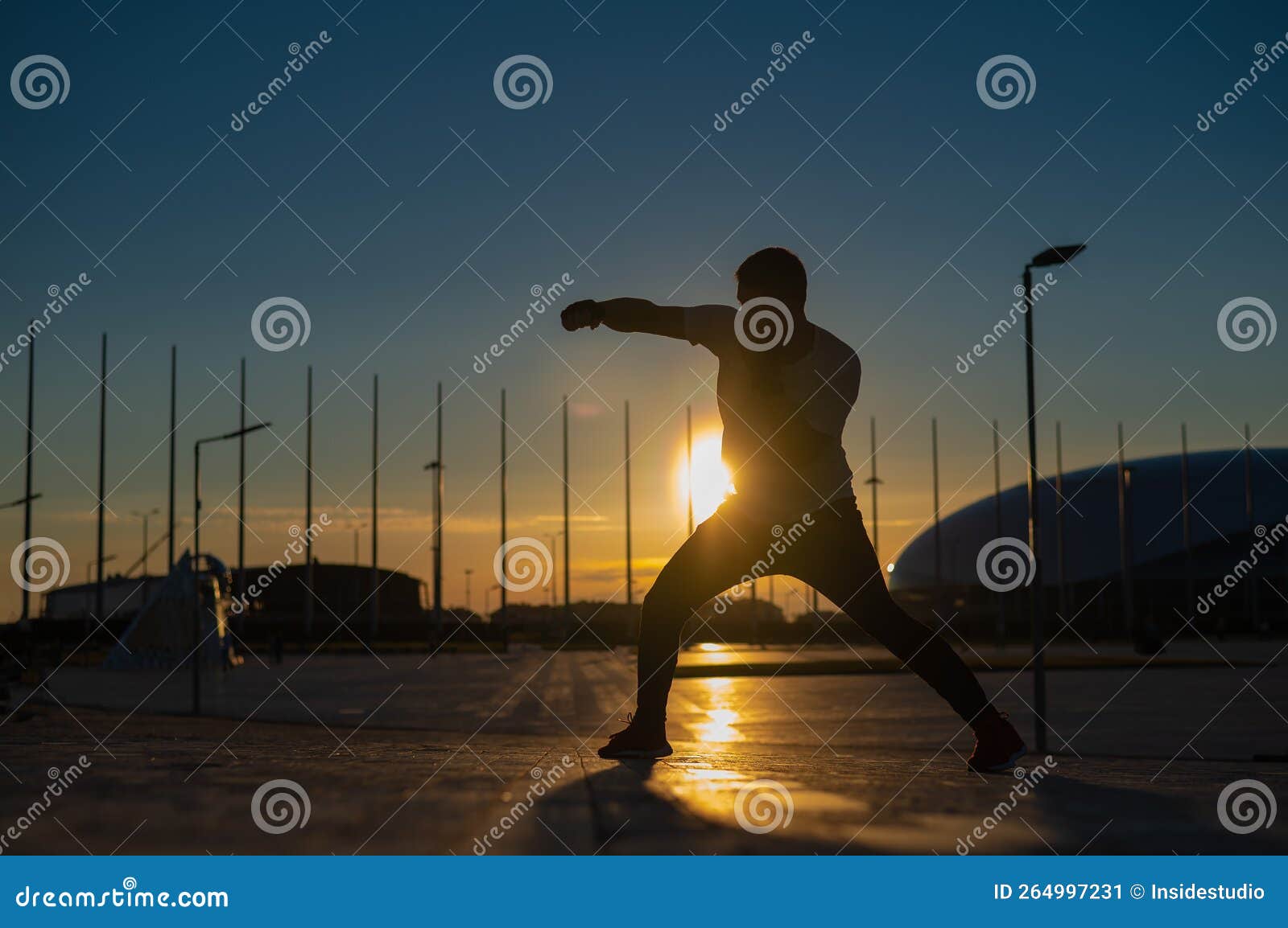 A Man Trains Boxing at Sunset Outdoors. Stock Image - Image of physical ...