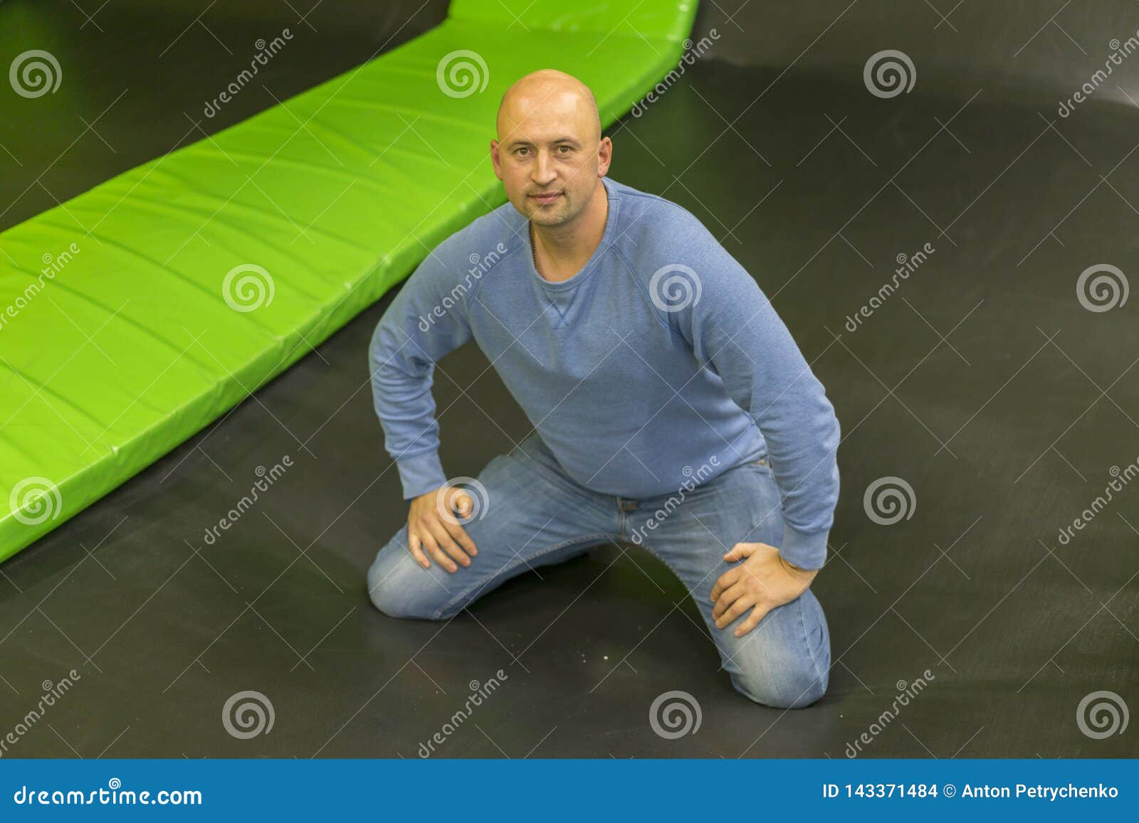 The Man on a Trampoline. the Man Fell on a Trampoline Stock Photo ...