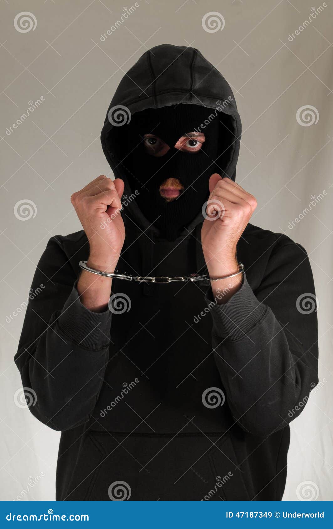 Man Trapped in Hancduffs stock image. Image of arrest - 47187349