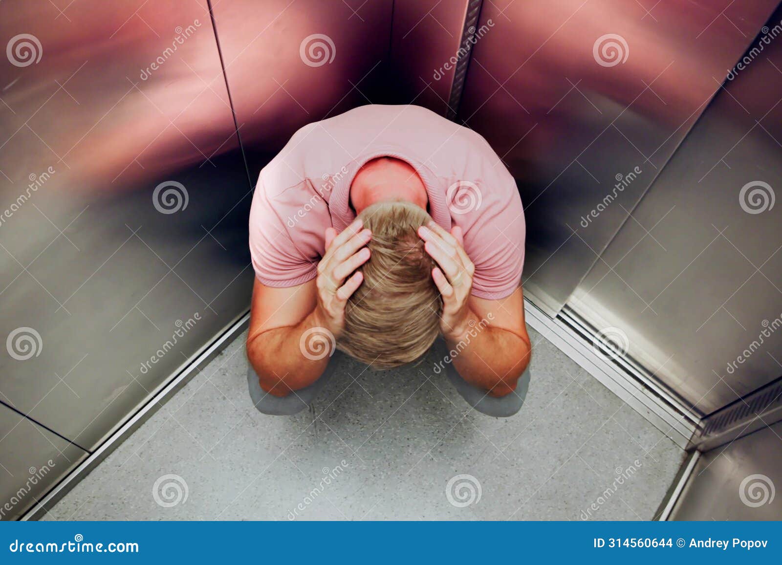 Man Trapped Inside Elevator: Overcoming Claustrophobia Stock Photo ...
