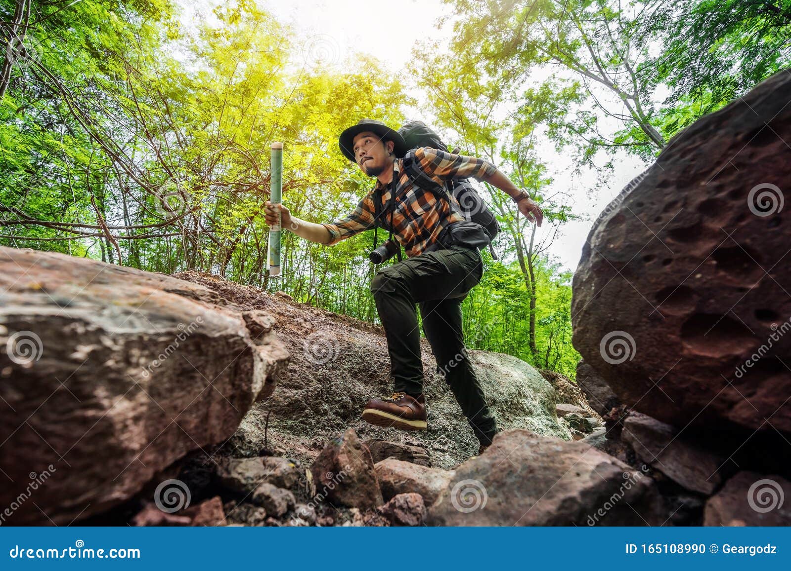 Man Traveler with Backpack Running in the Forest Stock Photo - Image of ...