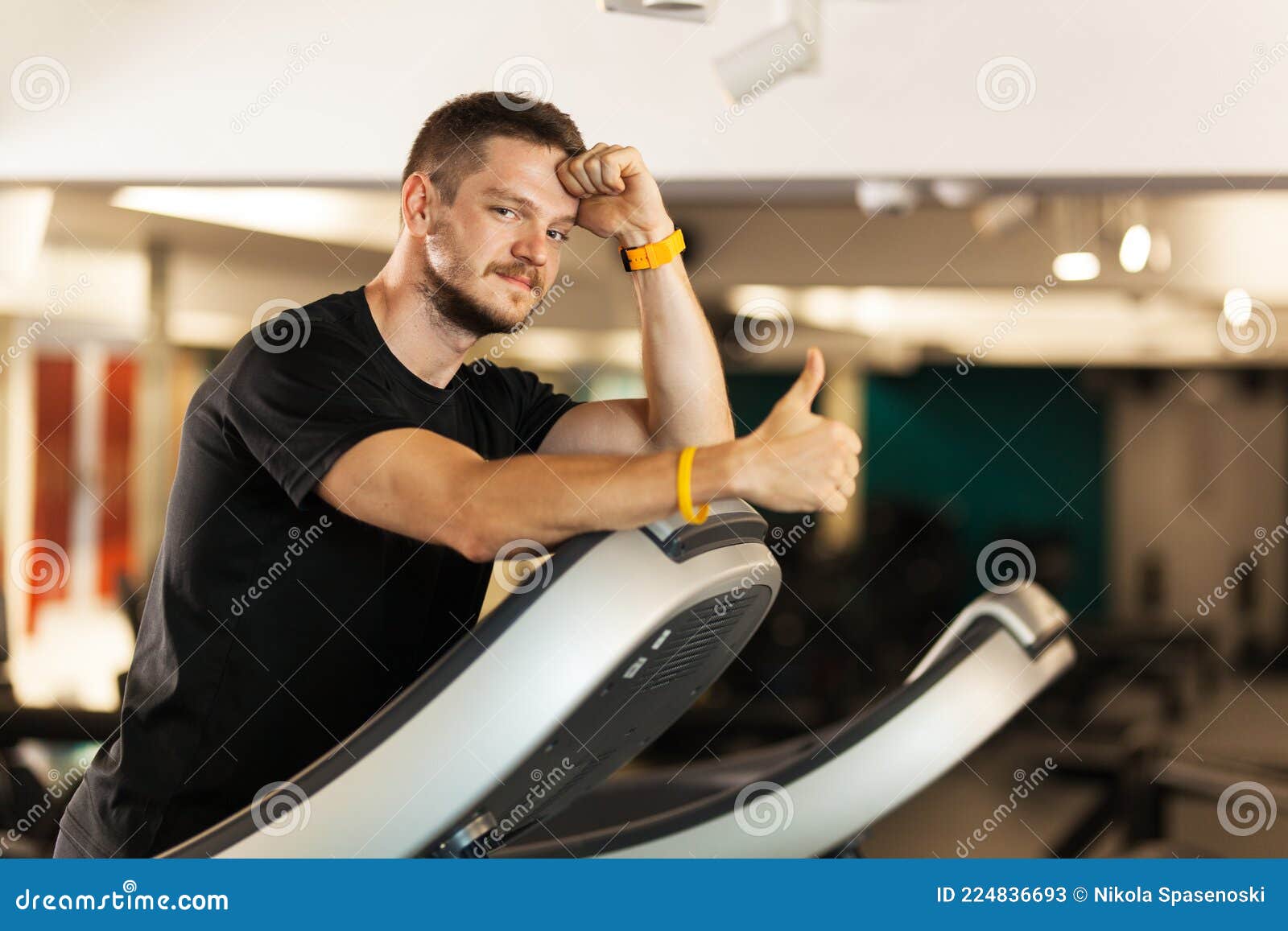 Man on a Treadmill Making Thumbs Up Gesture Looking at Camera Stock ...