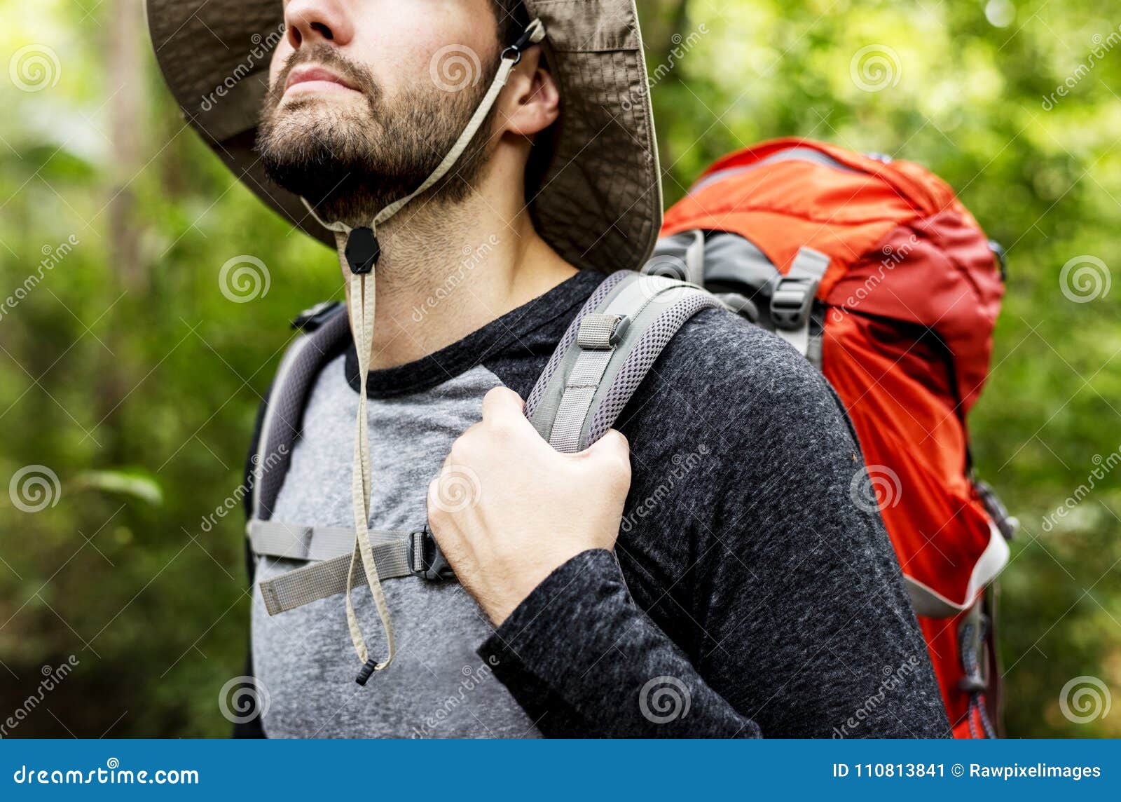Man Trekking in a forest stock image. Image of lifestyle - 110813841