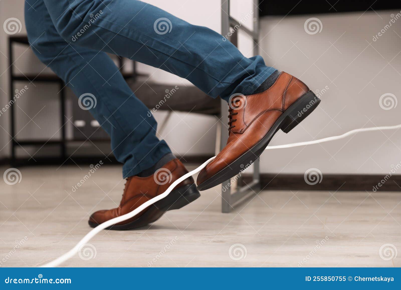 Man Tripping Over Cord in Office, Closeup Stock Image - Image of cord ...
