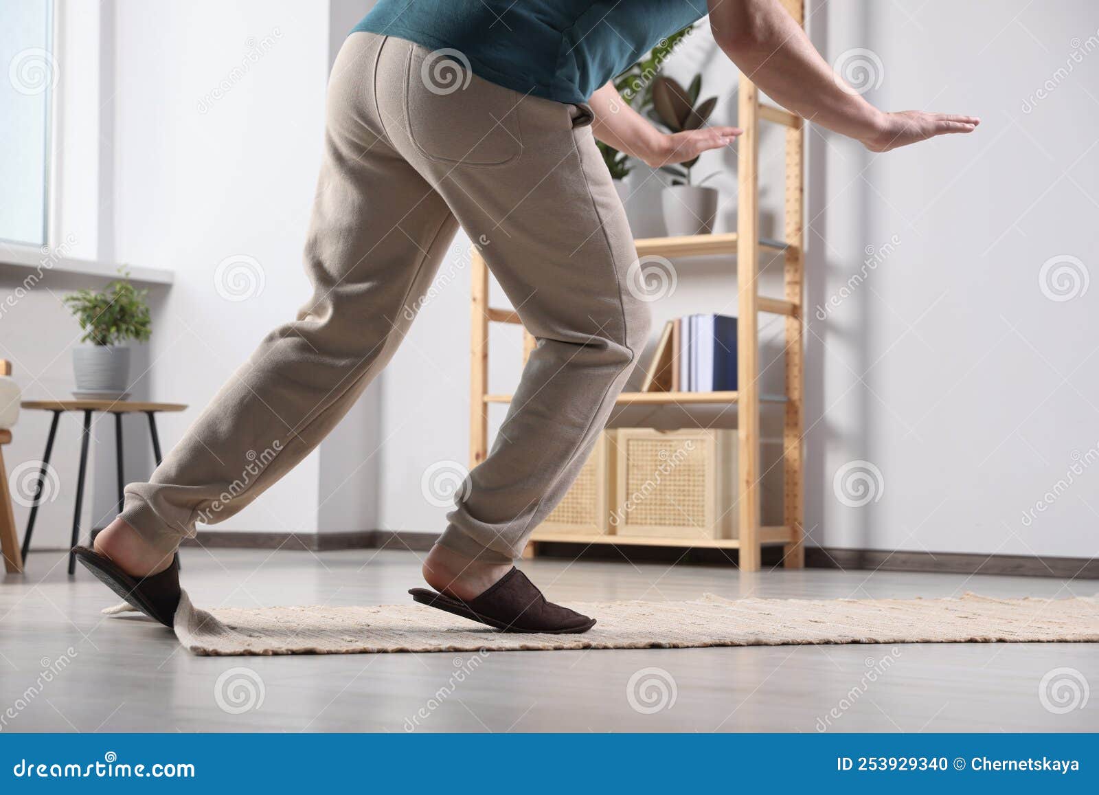 Man Tripping Over Rug at Home, Closeup Stock Photo - Image of failure ...